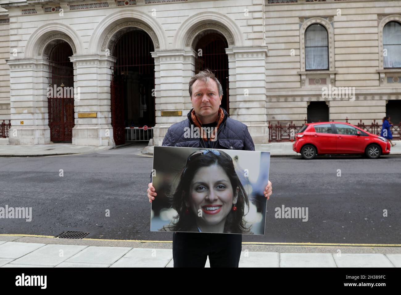 London, UK, 26 October 2021: Richard Ratcliffe holds up a photo of his ...