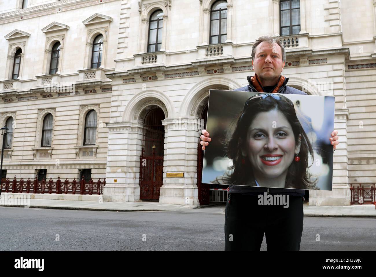 London, UK, 26 October 2021: Richard Ratcliffe holds up a photo of his ...