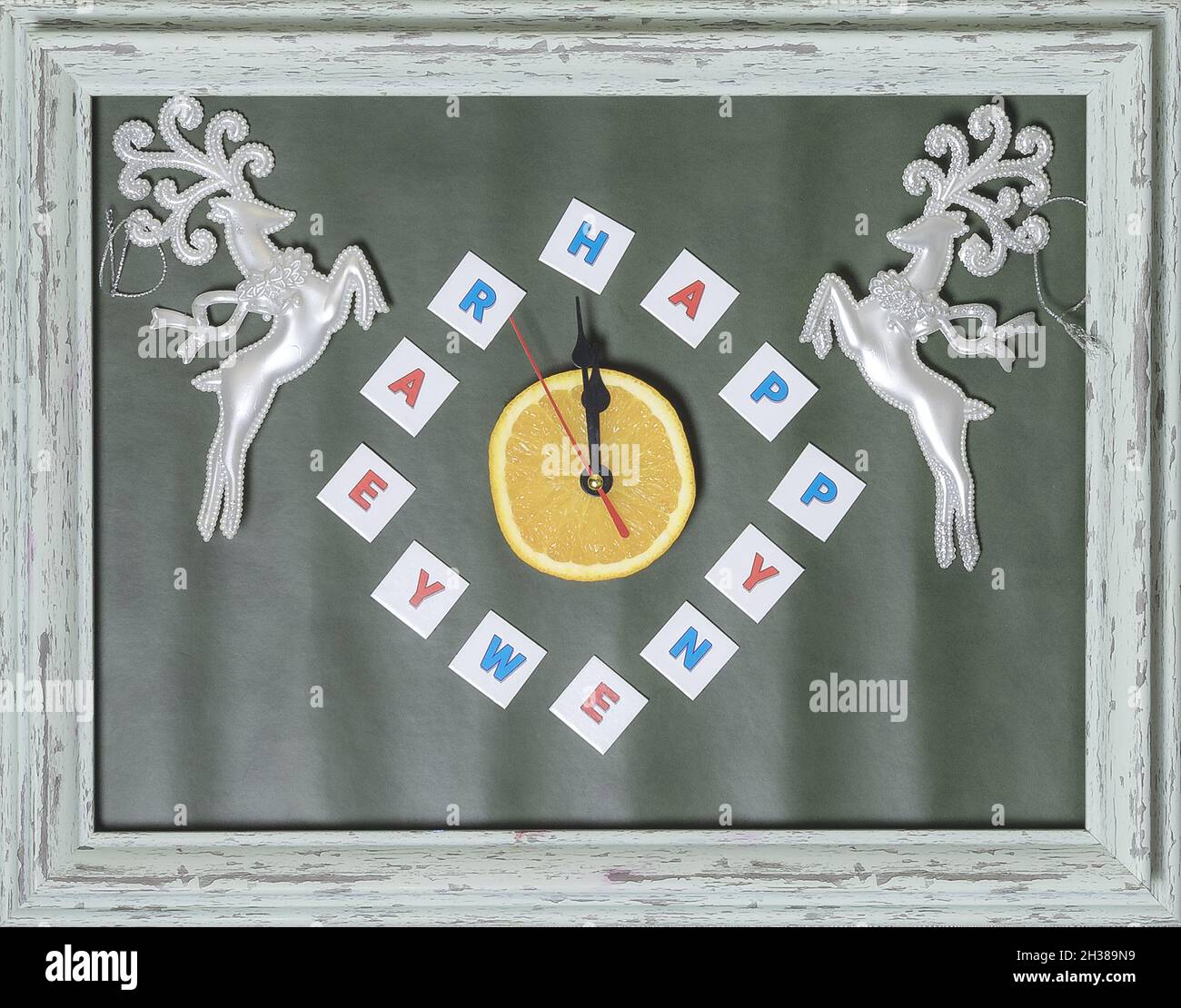 Imitation of a clock with hands and the inscription Happy New Year ...