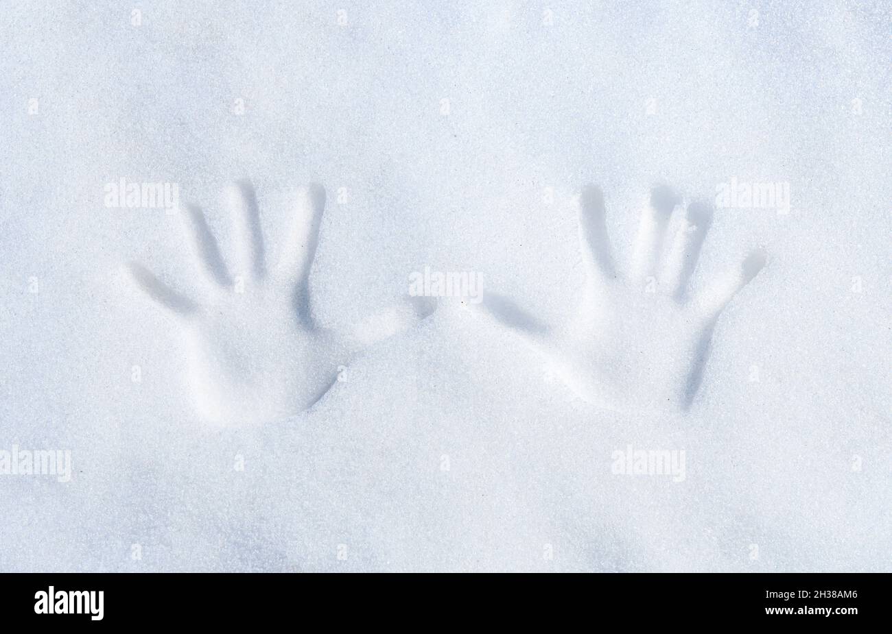 Handprint in the snow hand print imprint snow hi-res stock photography ...