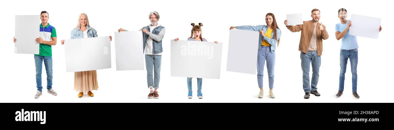 Different people with blank posters on white background Stock Photo - Alamy
