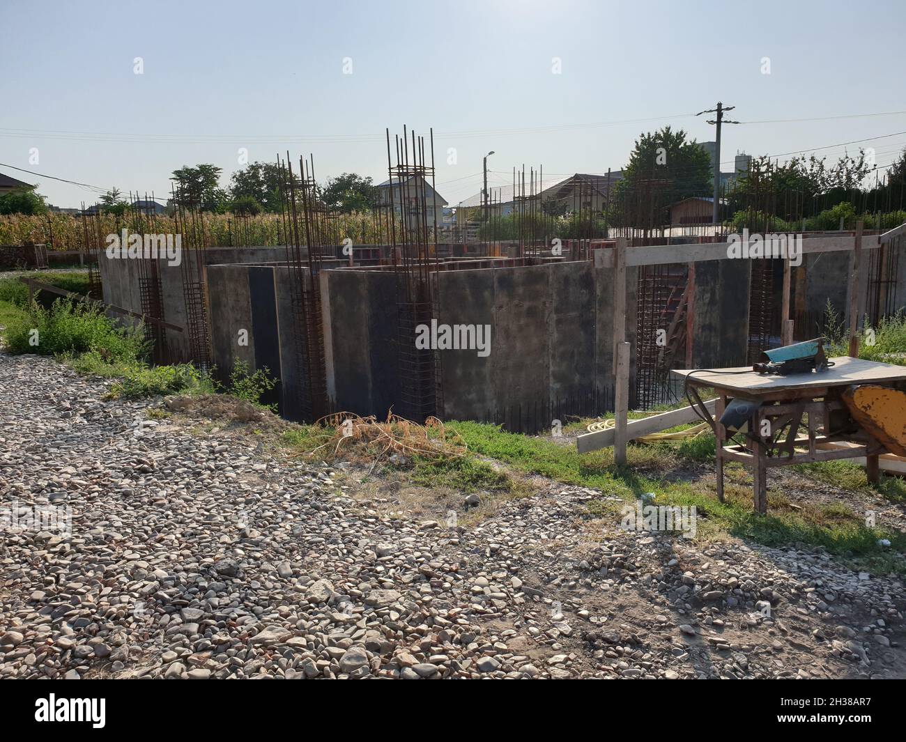 Half constructed building in abandoned area under the sky on a sunny ...
