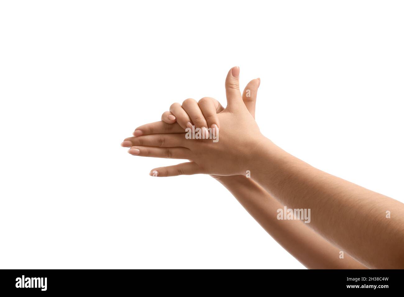 Woman making dog with her hands on white background Stock Photo - Alamy