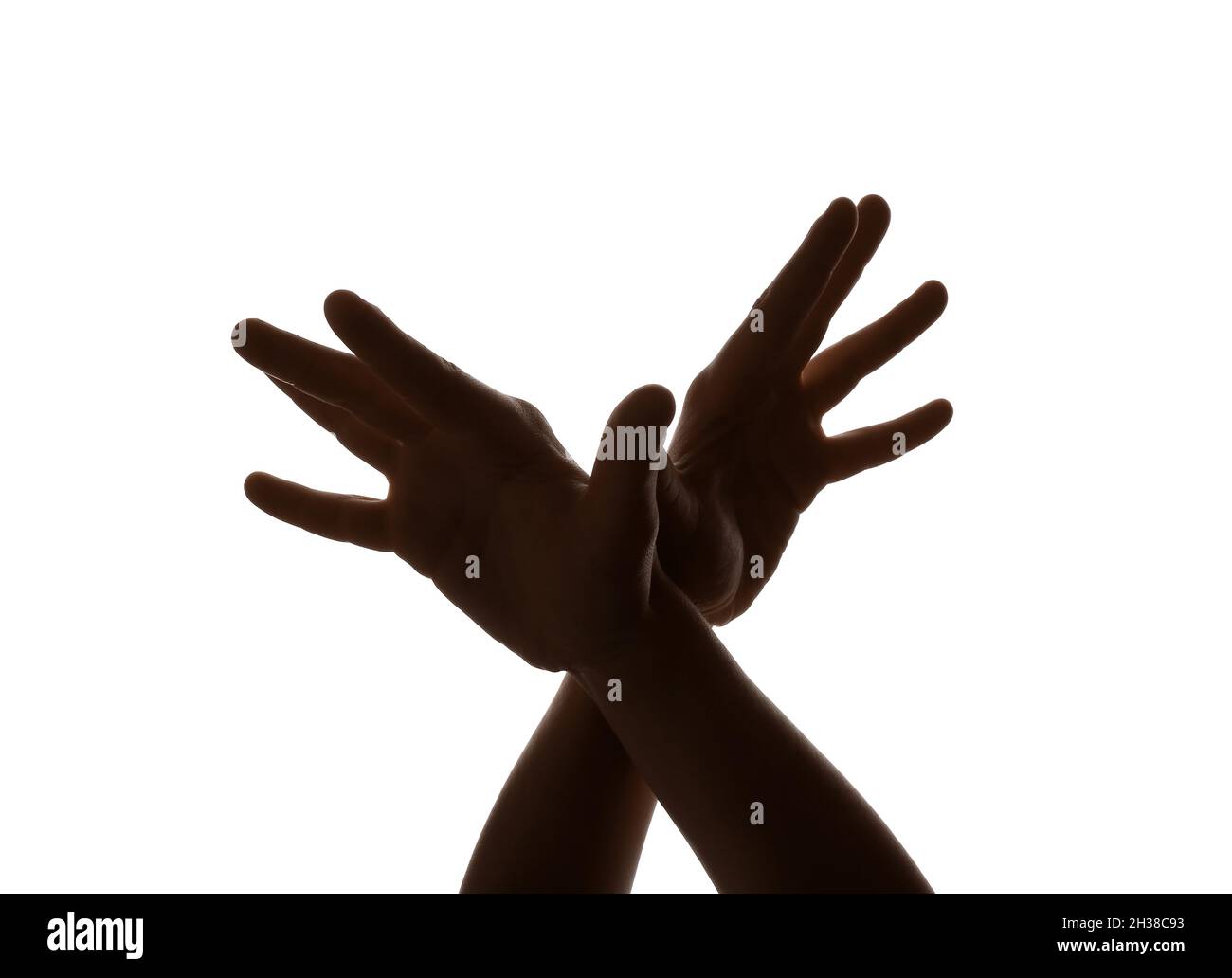 Child performing a shadow play on white background Stock Photo - Alamy