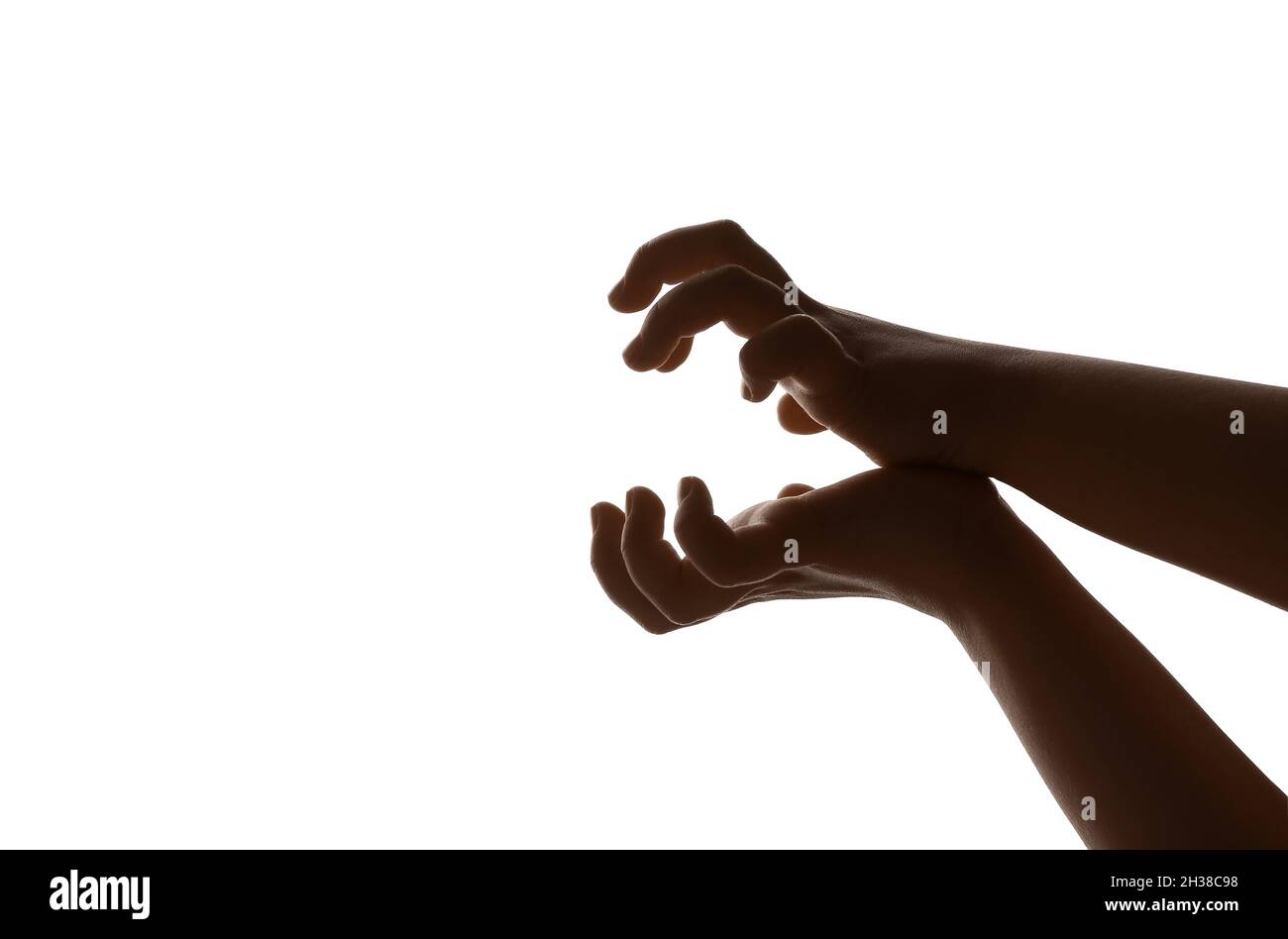 Child performing a shadow play on white background Stock Photo - Alamy