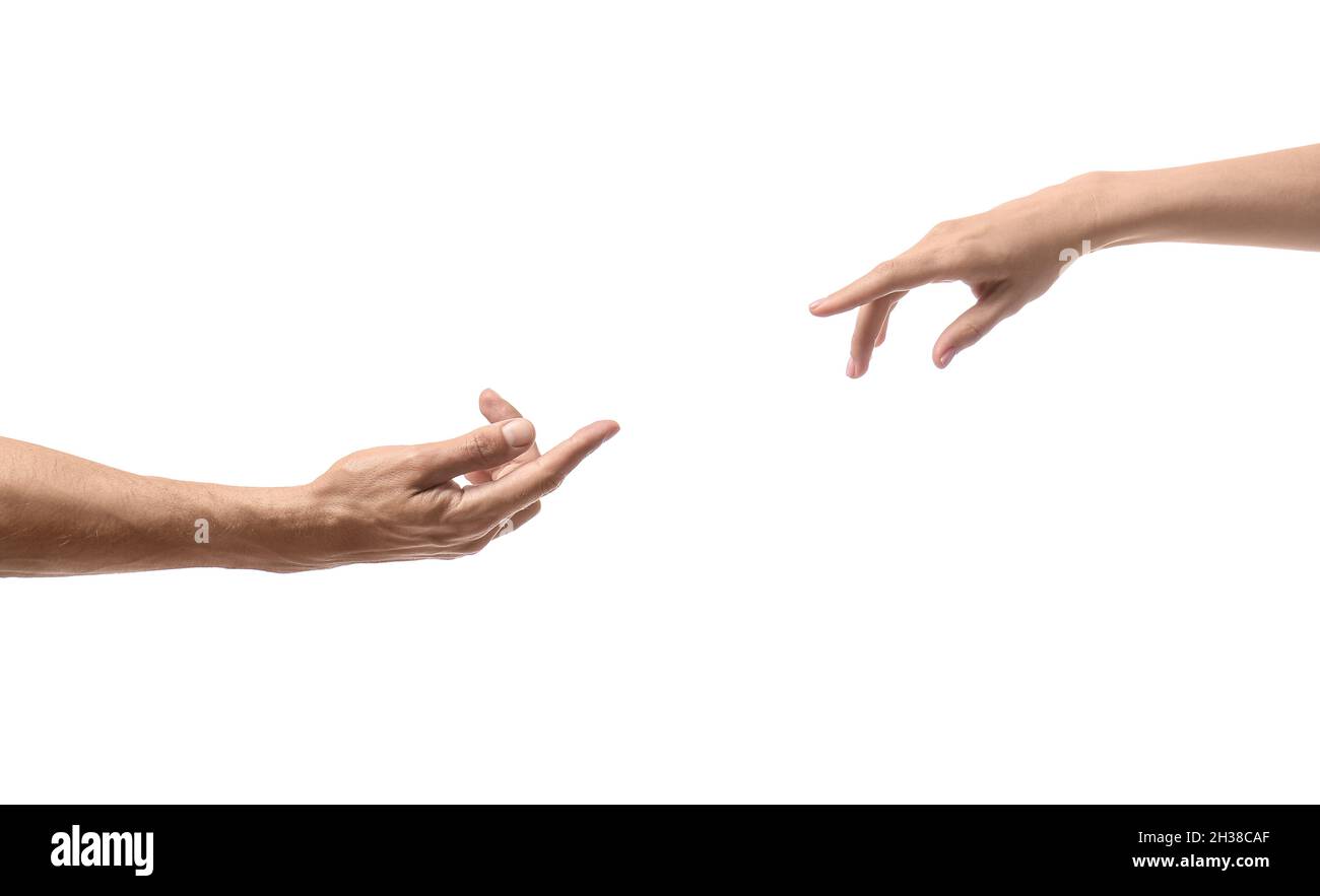 Woman and man reaching out to each other on white background Stock ...