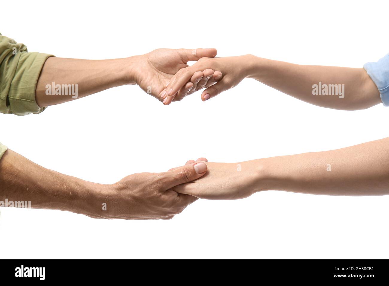 Woman and man holding hands on white background Stock Photo - Alamy