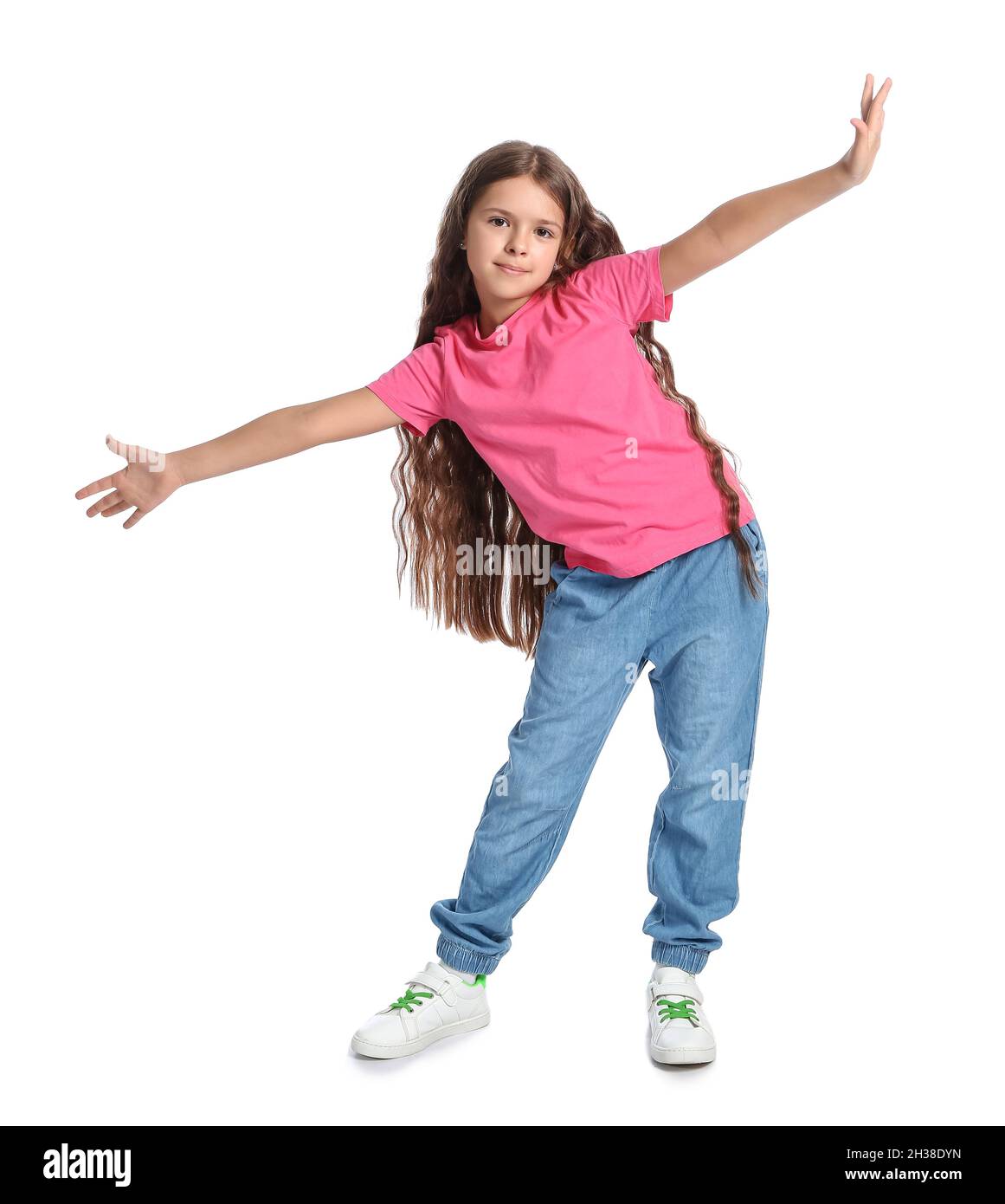 Cool dancing little girl on white background Stock Photo - Alamy