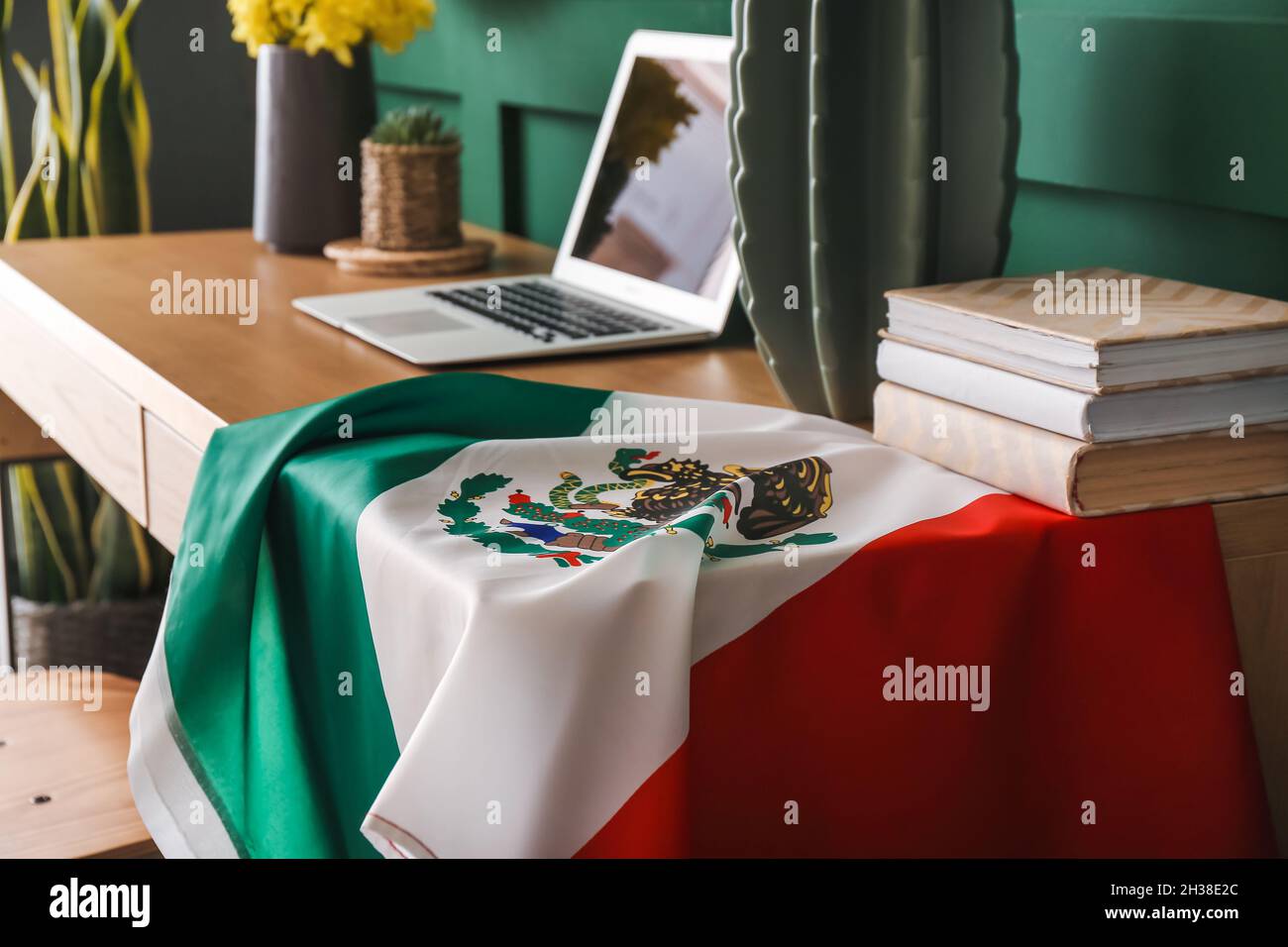 Mexican flag on table in room, closeup Stock Photo - Alamy