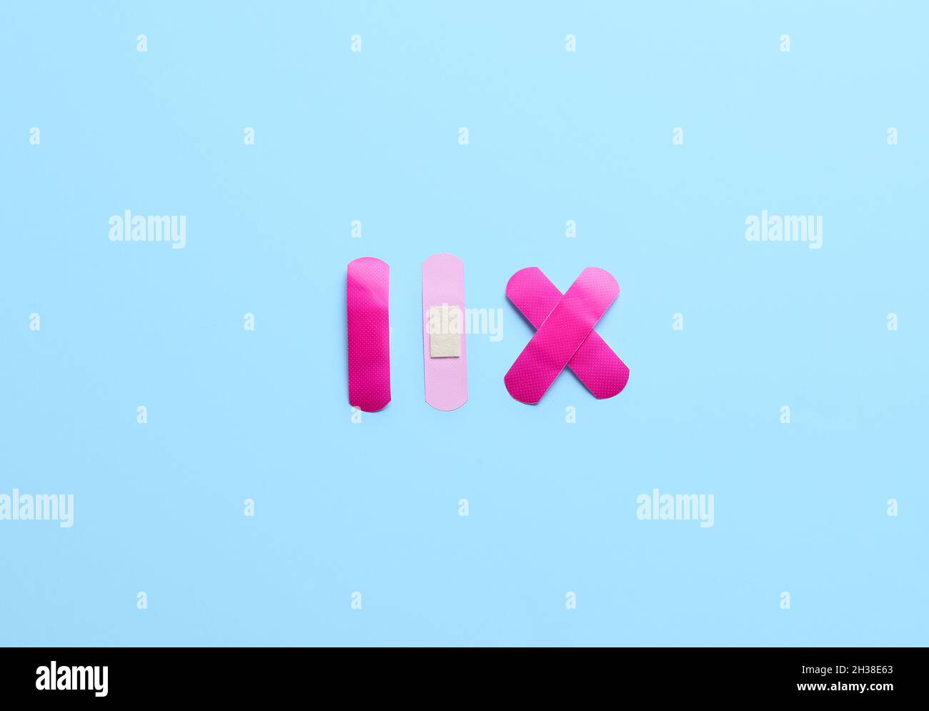 Crossed adhesive plaster hi-res stock photography and images - Alamy