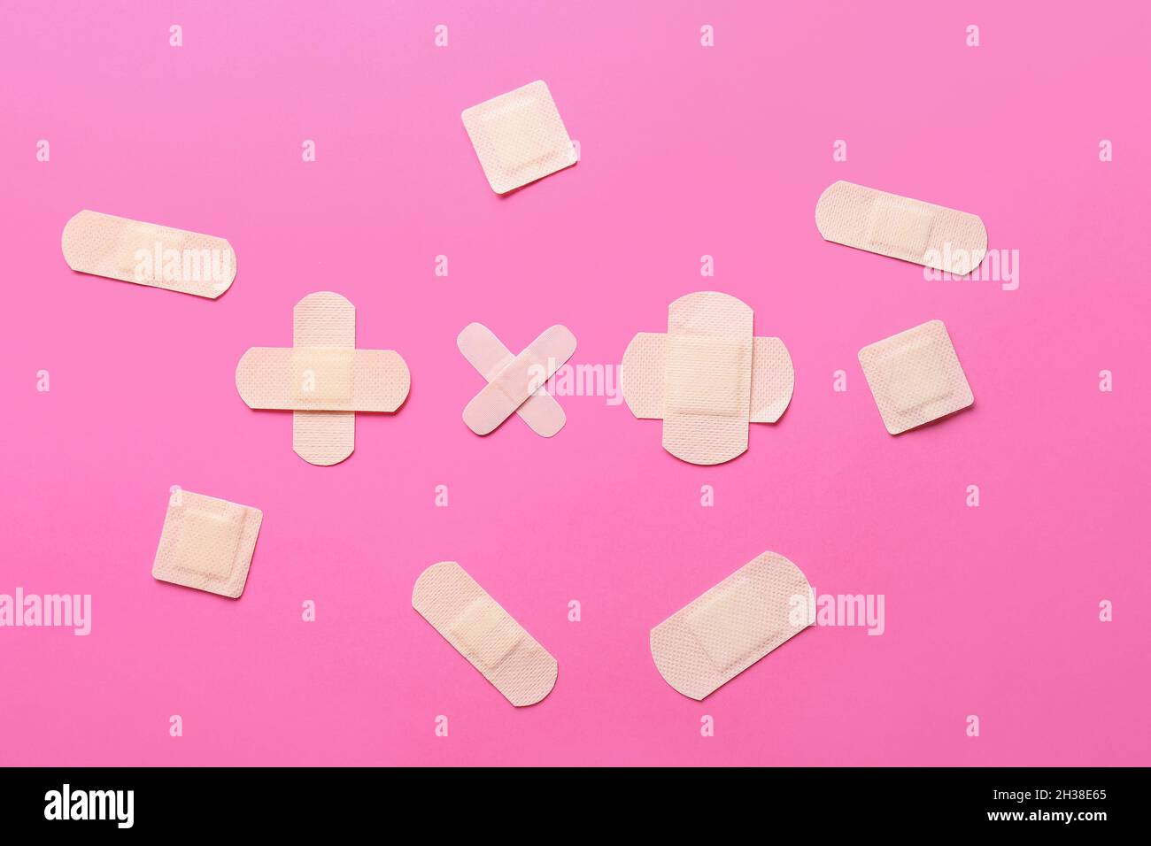 Crossed plasters hi-res stock photography and images - Alamy