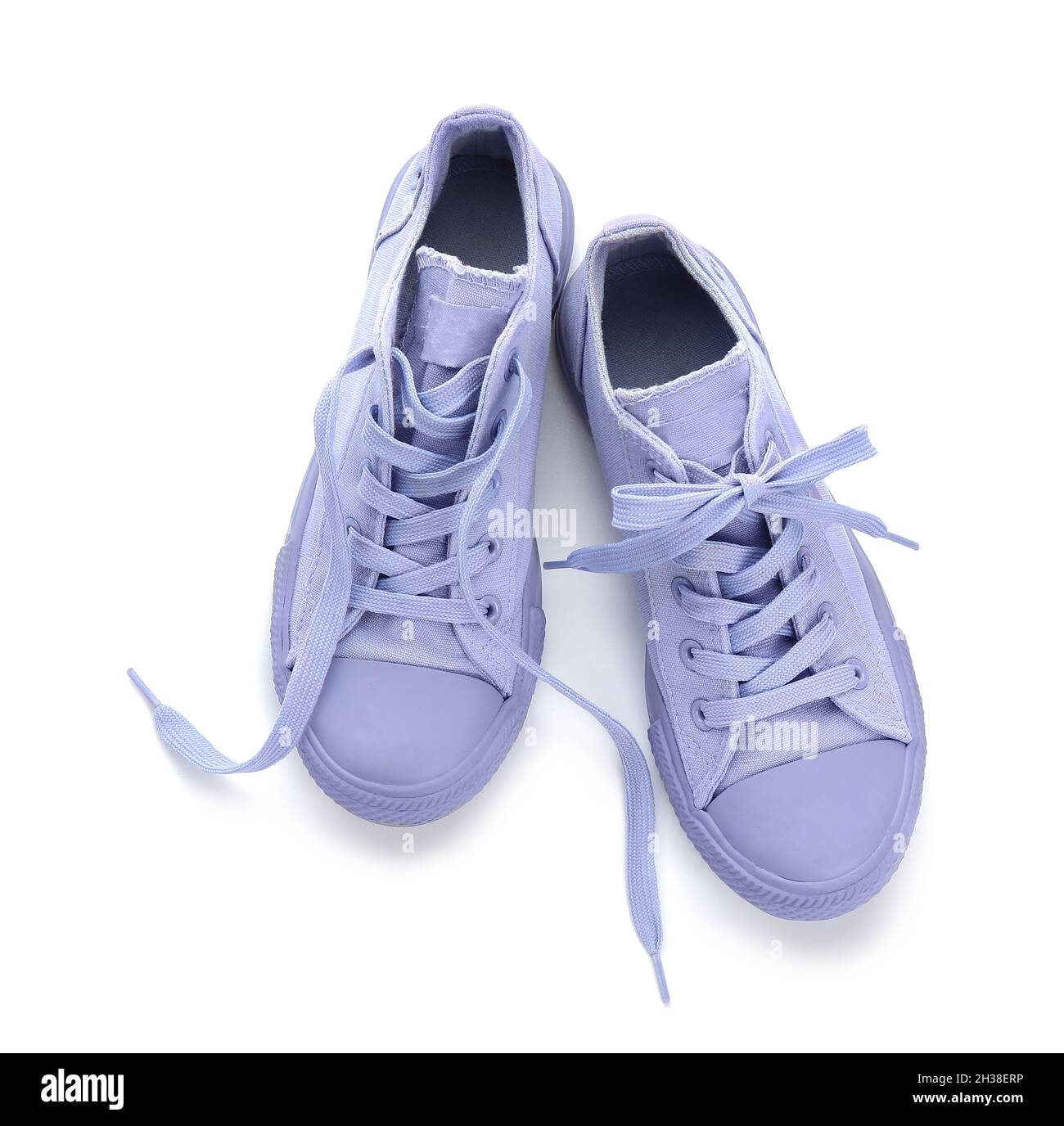 Stylish lilac shoes with laces on white background Stock Photo - Alamy