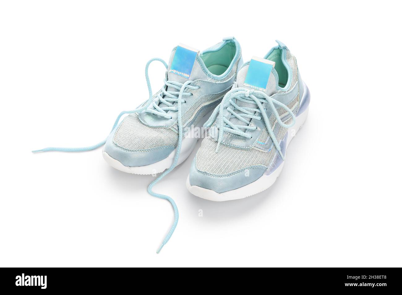 Blue sportive shoes with long laces on white background Stock Photo - Alamy