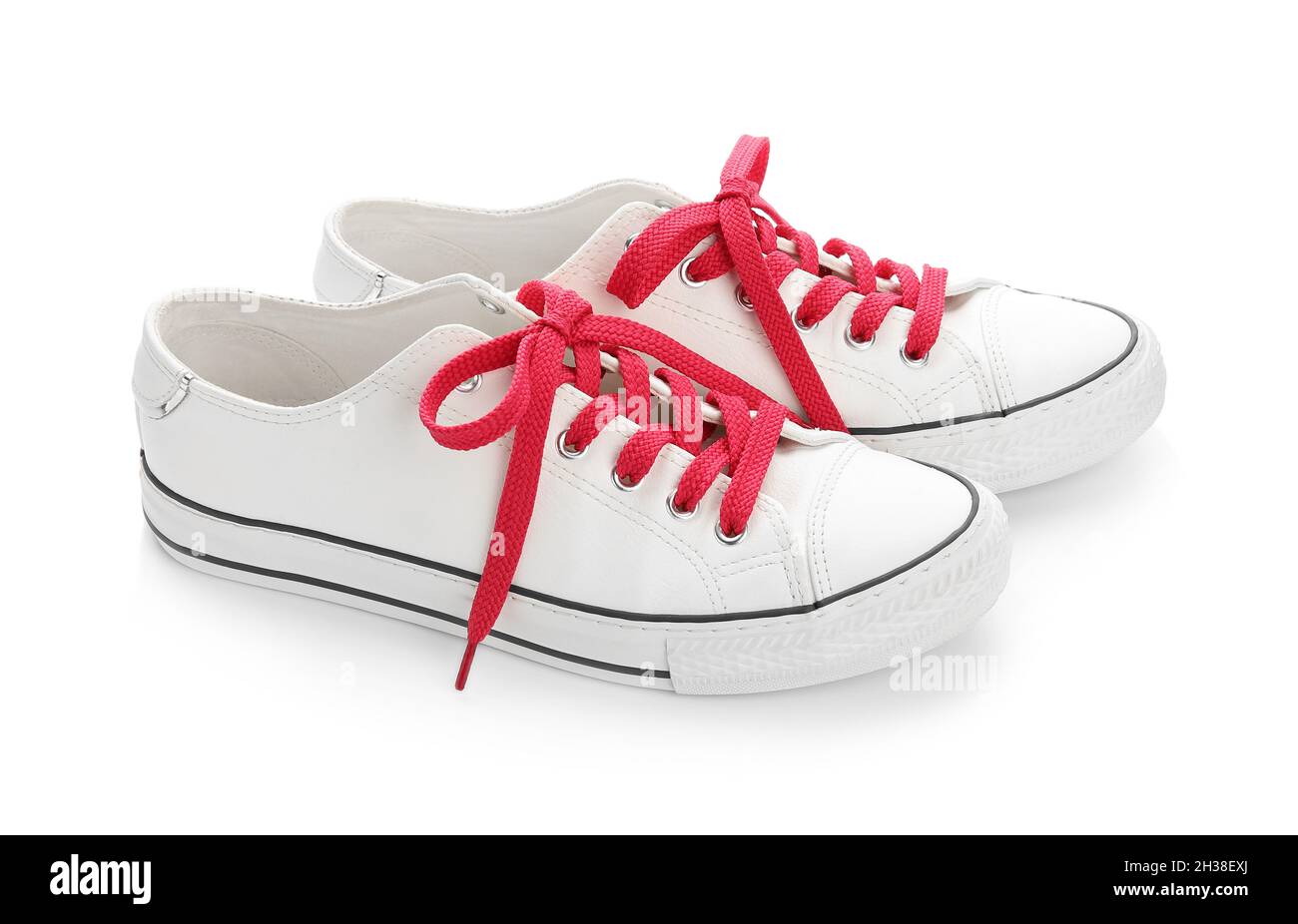 Stylish shoes with red laces on white background Stock Photo - Alamy