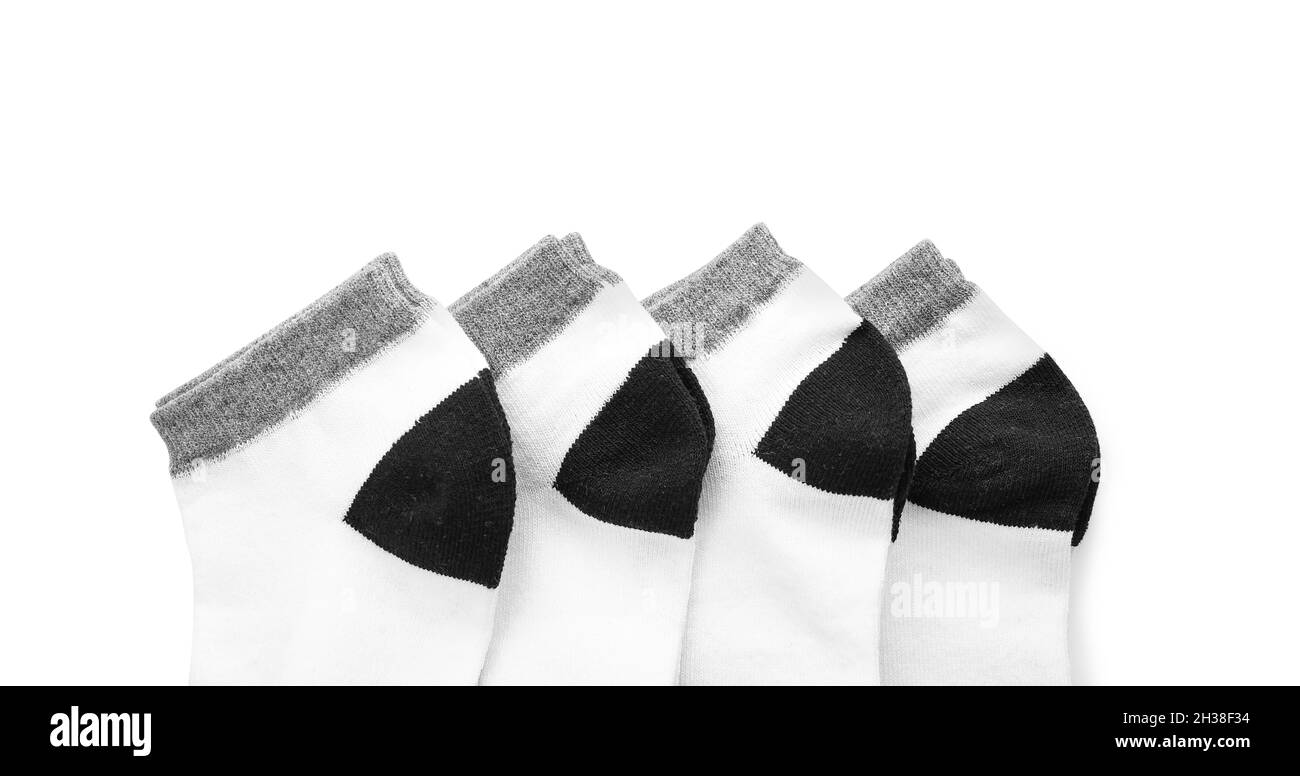 Many socks on white background Stock Photo - Alamy