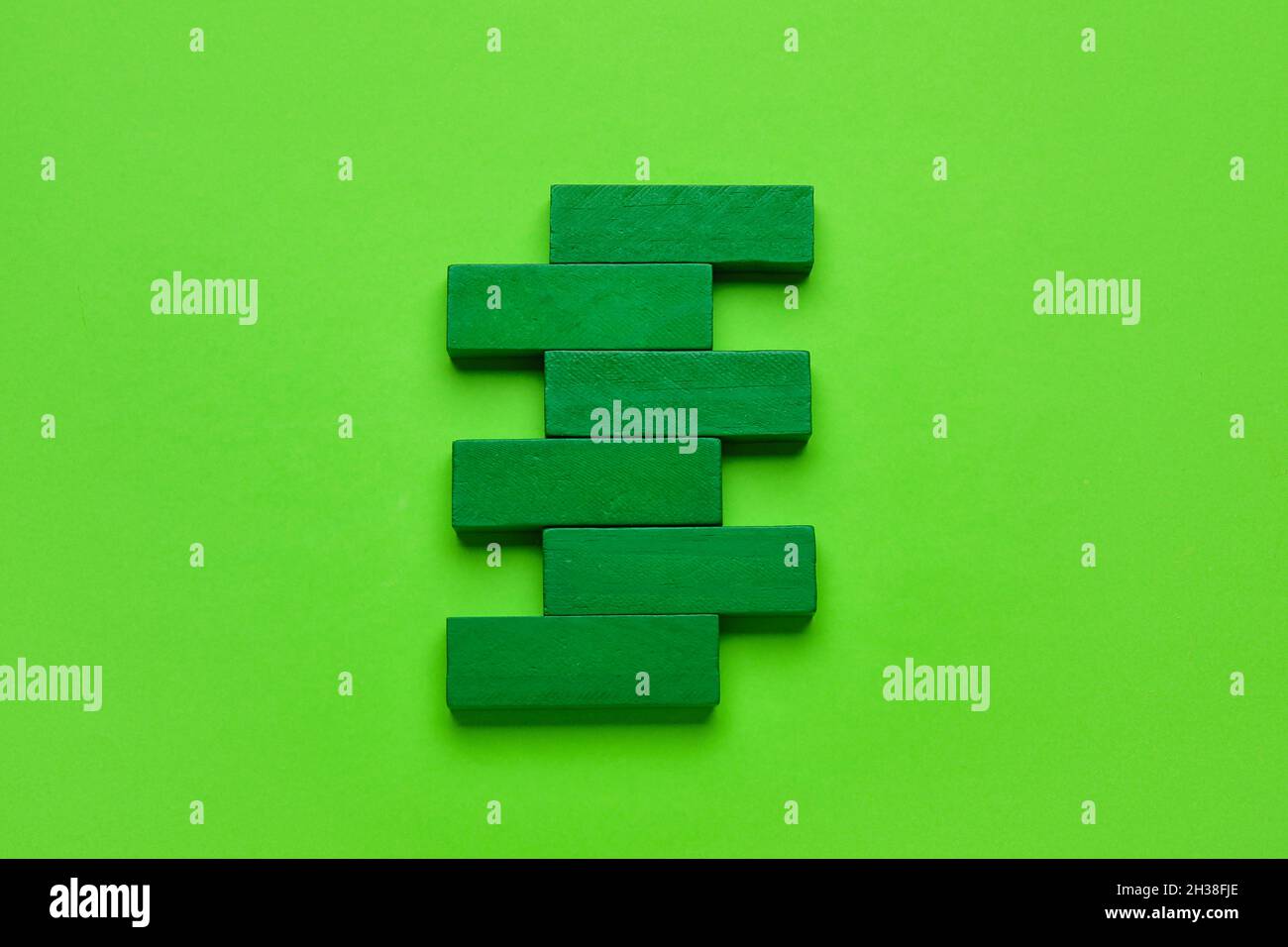 Green blocks on color background Stock Photo - Alamy