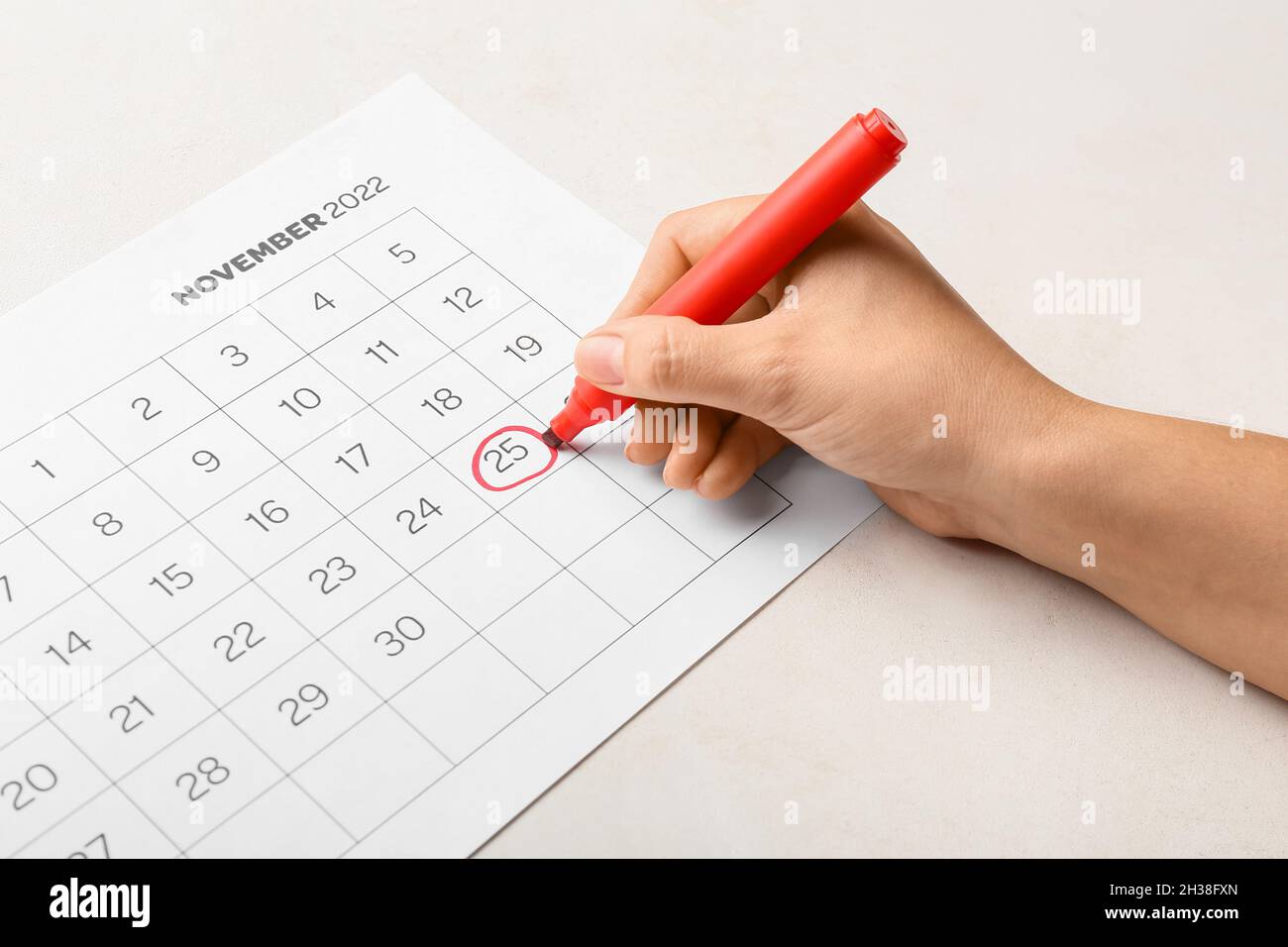 Person marking date in online hi-res stock photography and images - Alamy