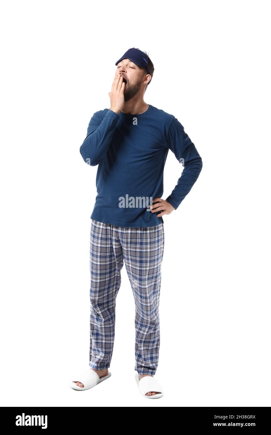 Sleepy young guy yawning Cut Out Stock Images & Pictures - Alamy