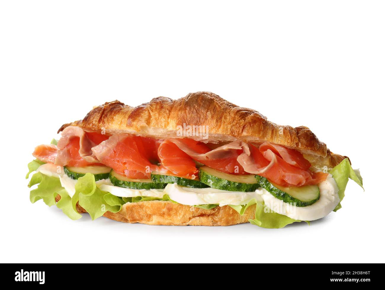 Delicious croissant sandwich with fish on white background Stock Photo ...