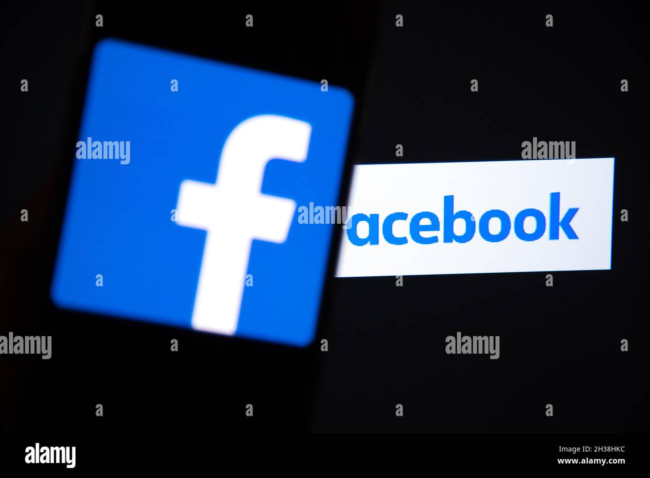 In this photo illustration, the Facebook logo seen displayed on a ...