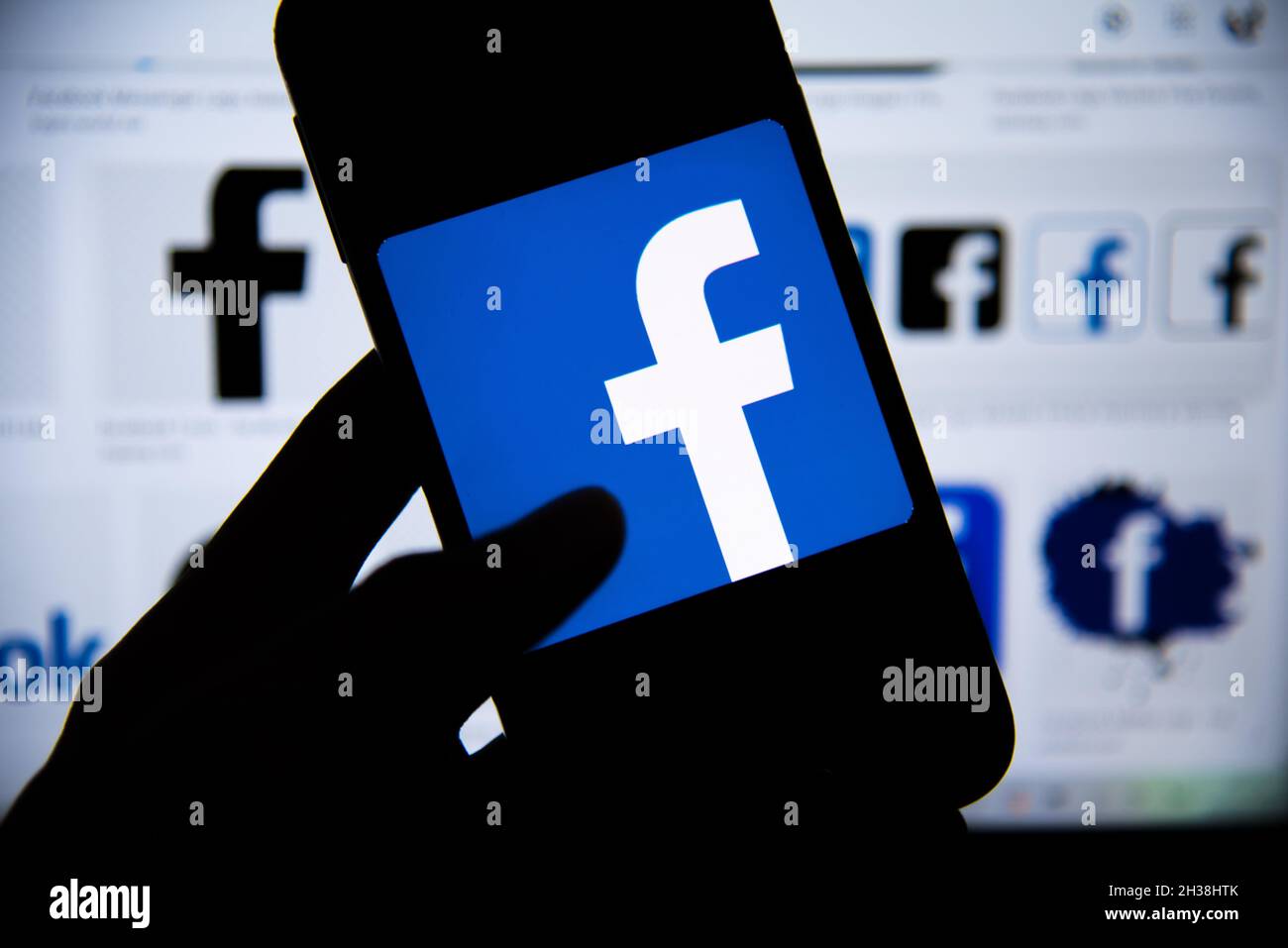 In this photo illustration, the Facebook logo seen displayed on a mobile phone screen. (Photo by ...