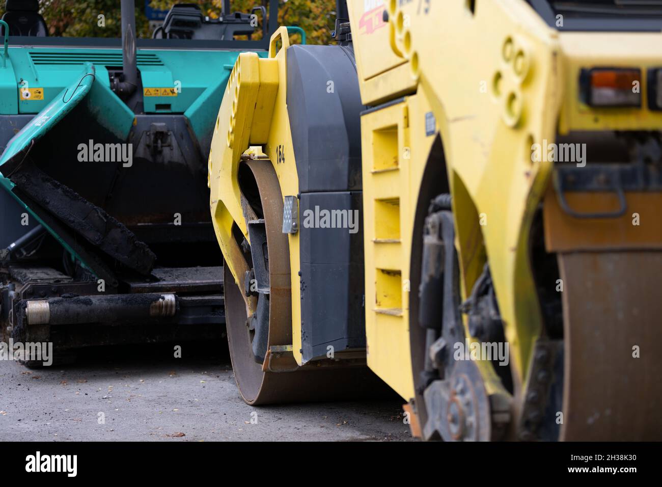 Close up picture of construction device, yellow stamp Stock Photo - Alamy