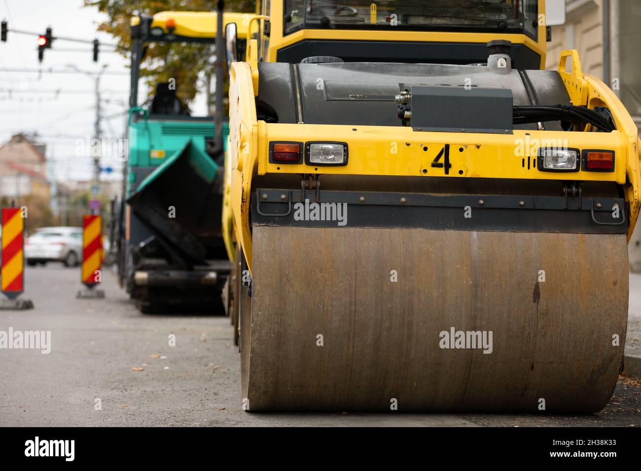 Close up picture of construction device, yellow stamp Stock Photo - Alamy