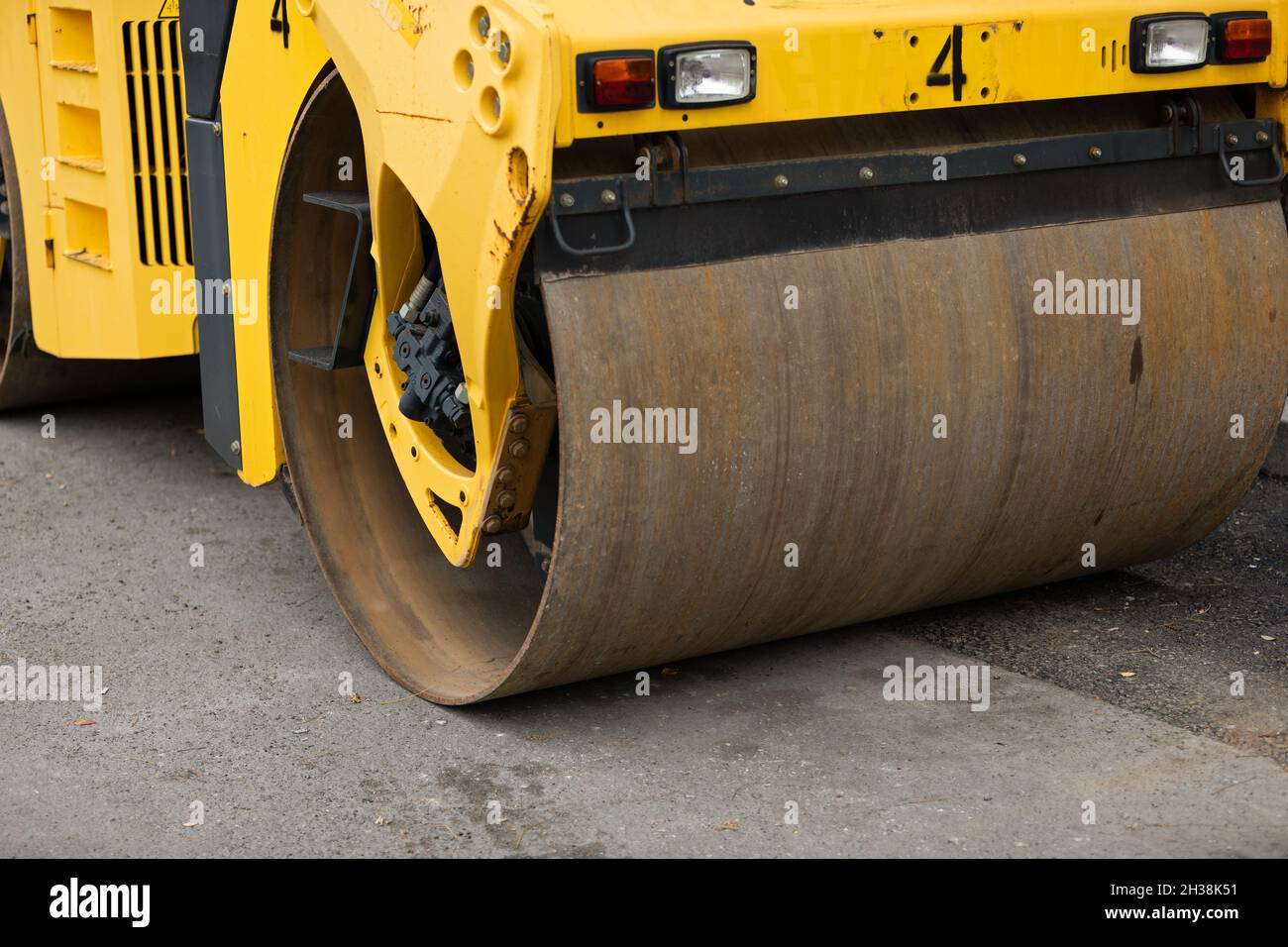 Close up picture of construction device, yellow stamp Stock Photo - Alamy