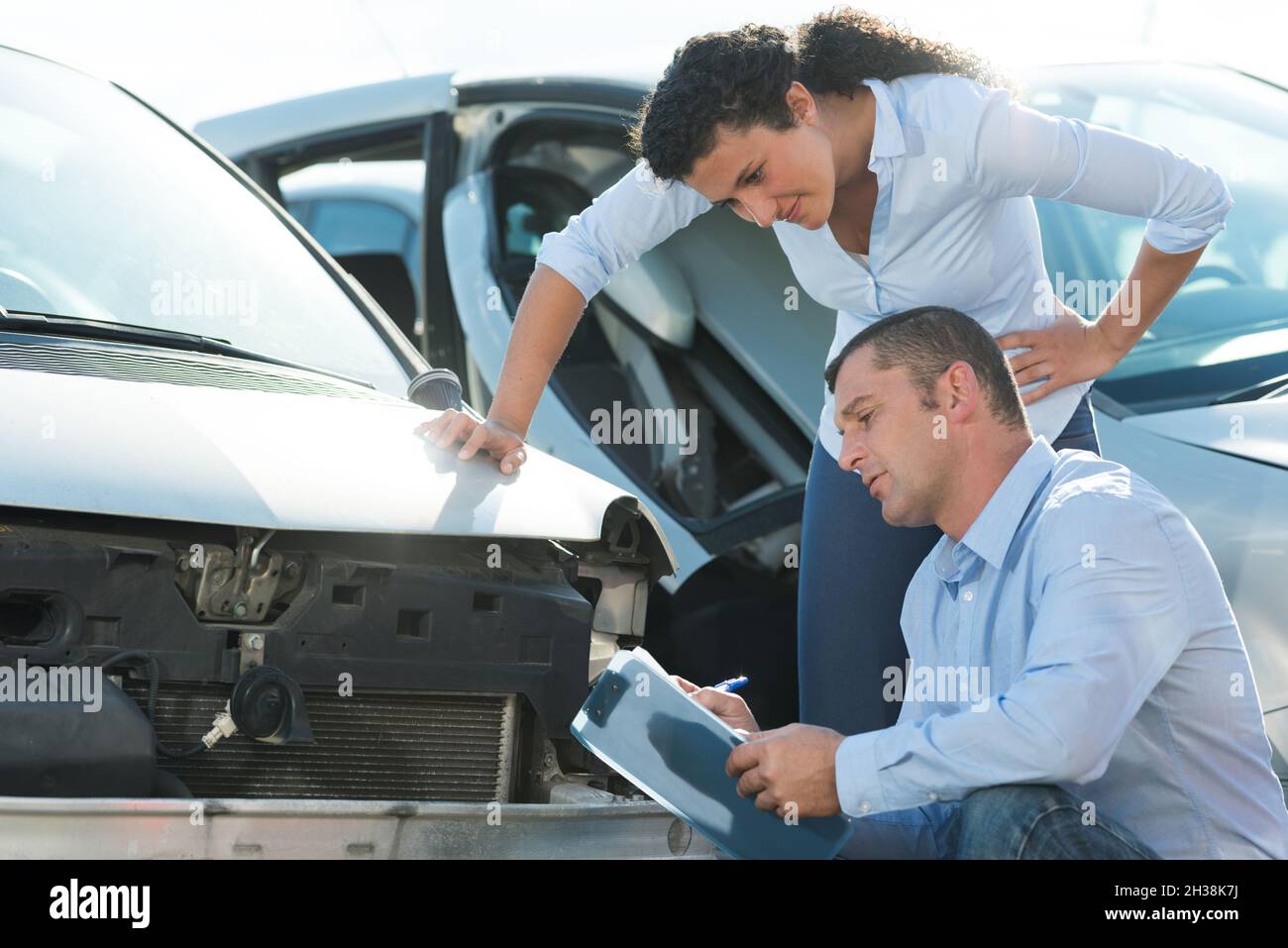 car mechanic checking a car engine Stock Photo - Alamy