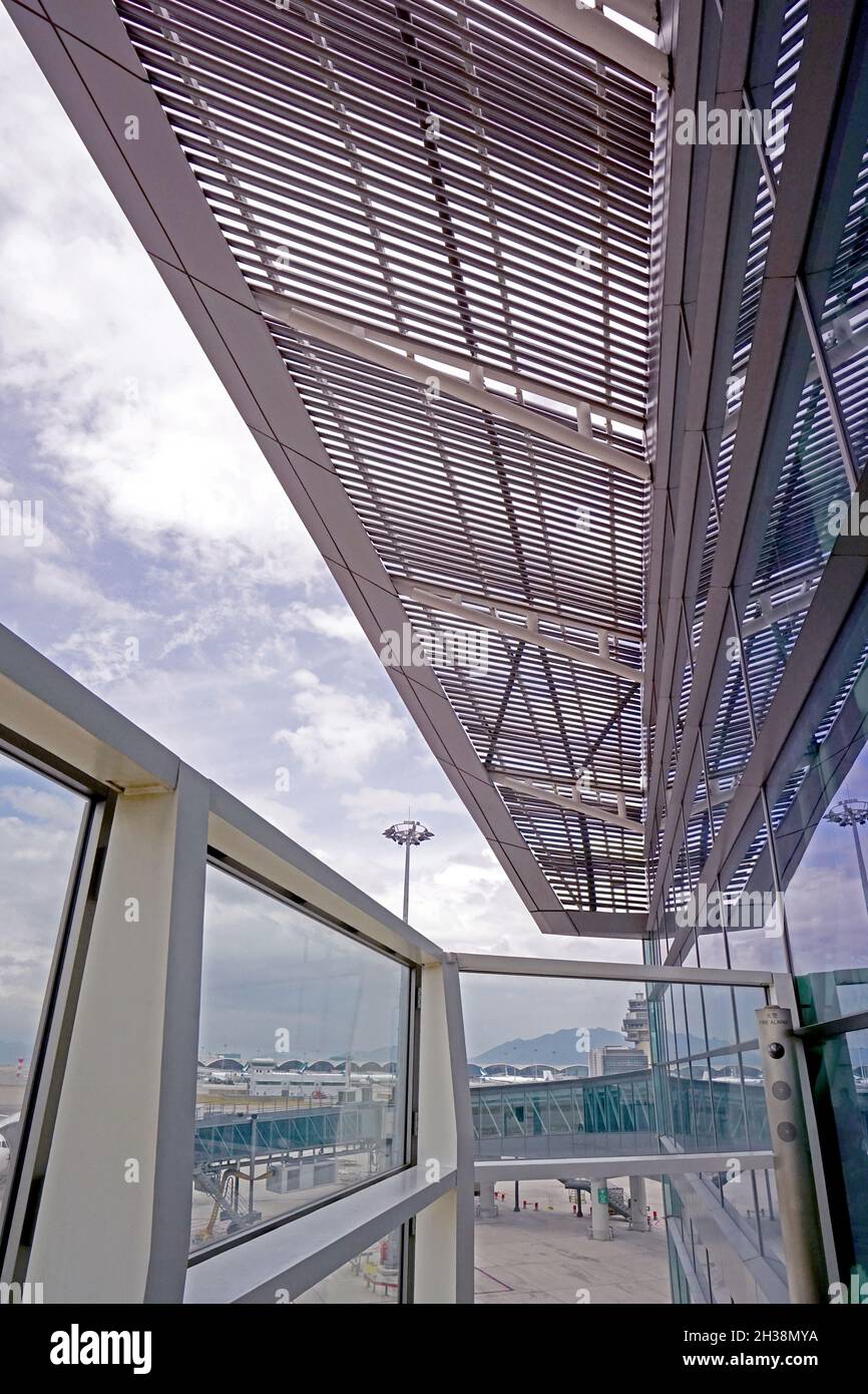 Vertical shot of a metallic roof of an airport terminal building with ...