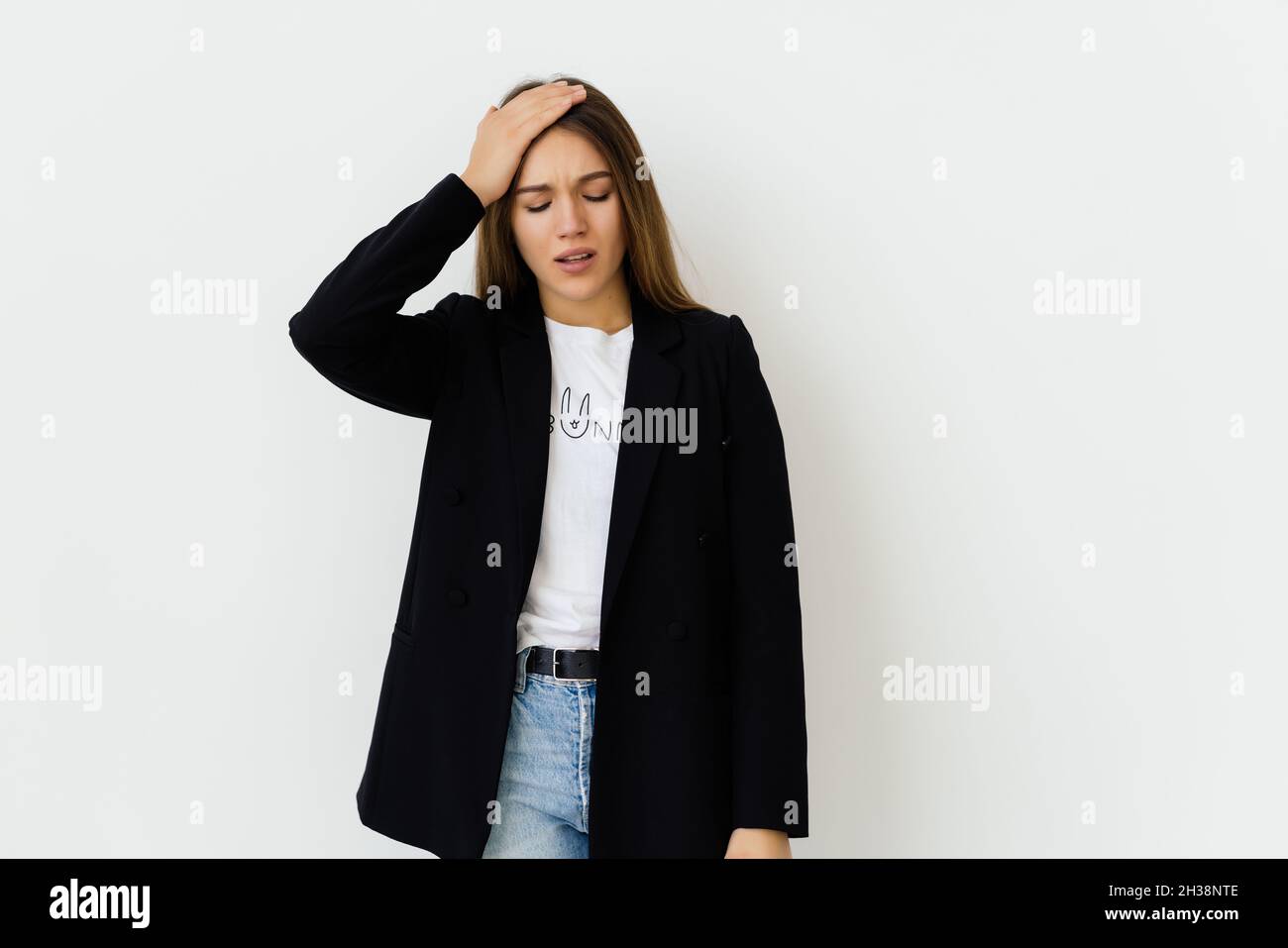 Forgetful young woman slap forehead and gasping, realise something ...