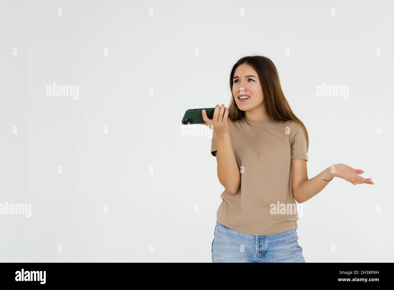 Confused woman student phone hi-res stock photography and images - Alamy