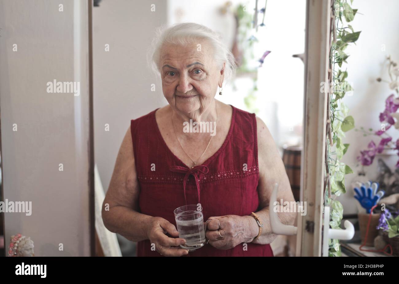 Elderly lady in care home hi-res stock photography and images - Alamy