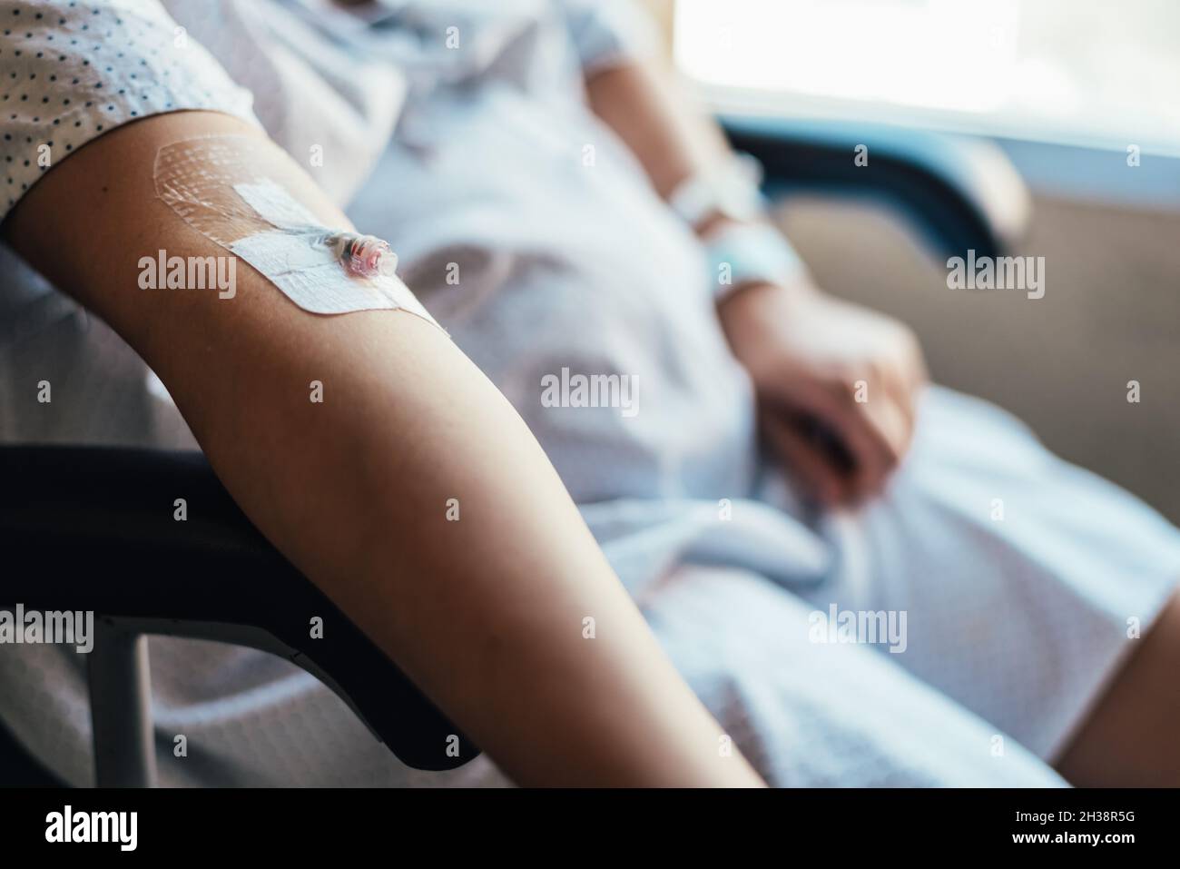 Intravenous drip arm hi-res stock photography and images - Alamy