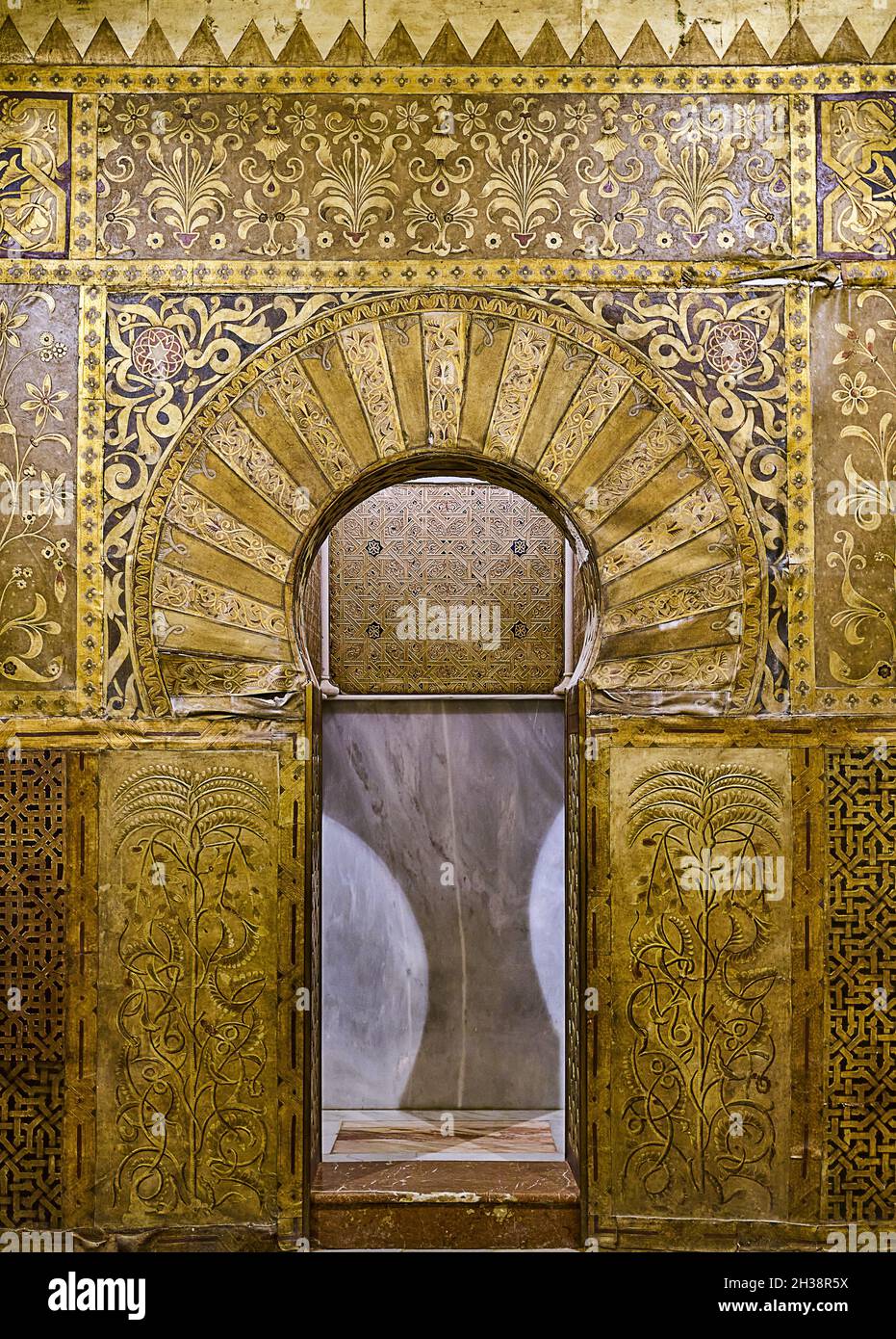 Arabic style door, covered with gold and leather, in a mosque Stock ...