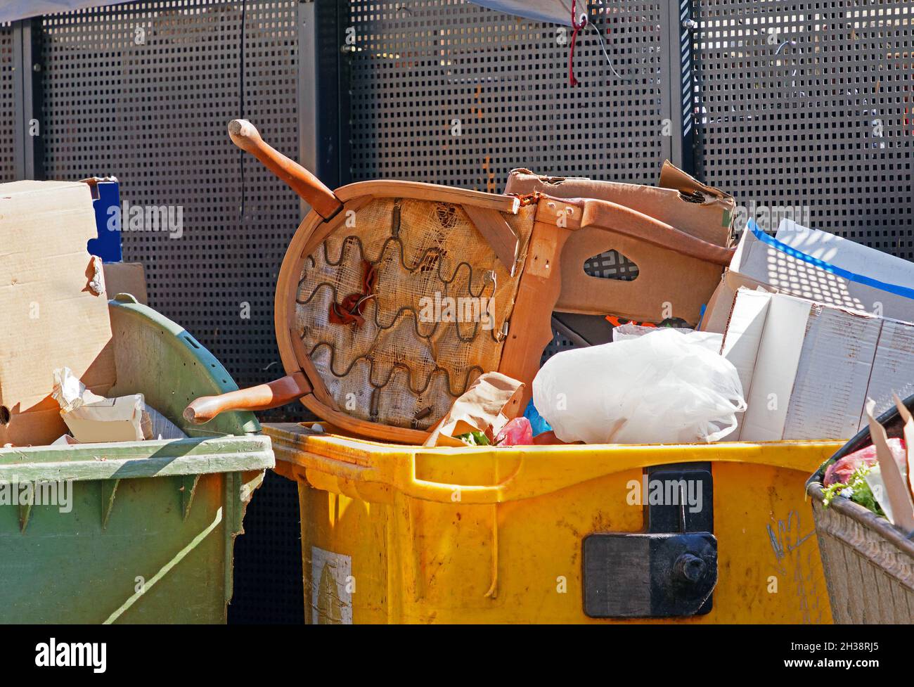 Plastic containers overflown with garbage on urban city street Stock ...