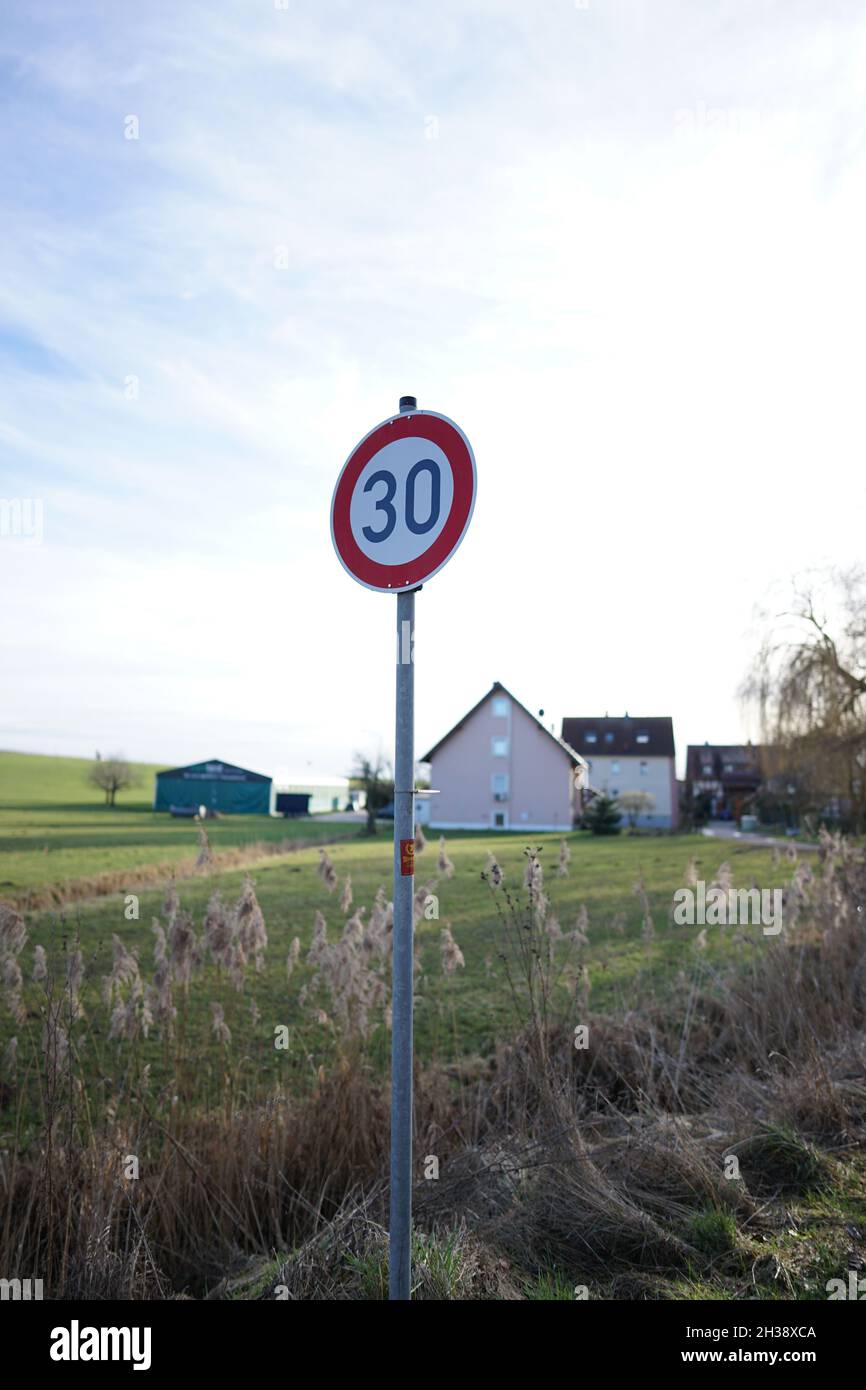 Vertical shot of a number 30 traffic limit sign Stock Photo - Alamy