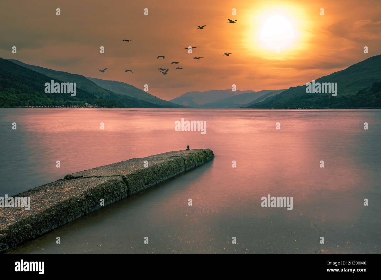 Beautiful scenery of the great view of sunset and a mountain, birds ...