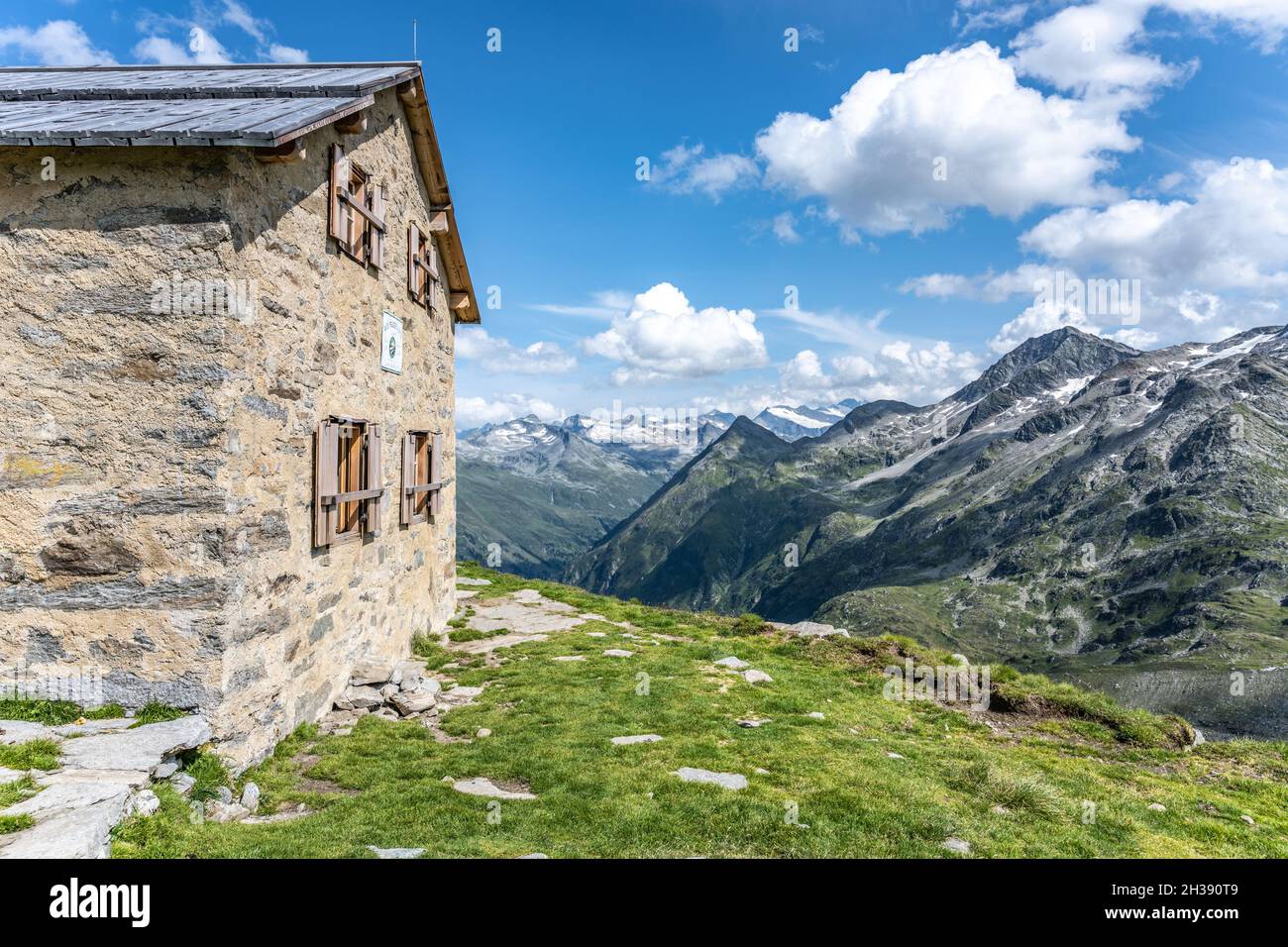 Small stone alpine hut in austrian Alps Stock Photo - Alamy