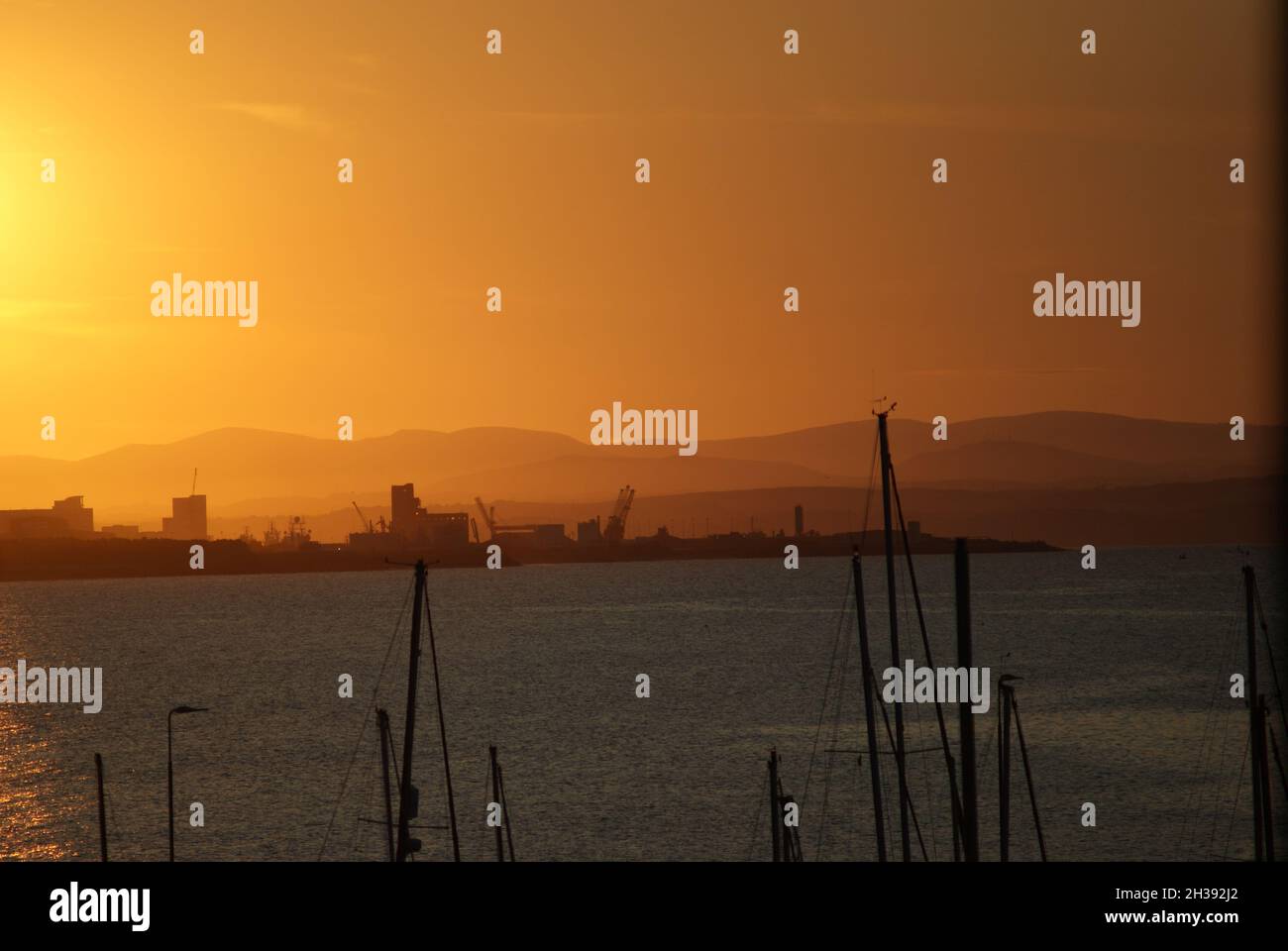 Sunset from Musselburgh looking towards Leith Stock Photo - Alamy