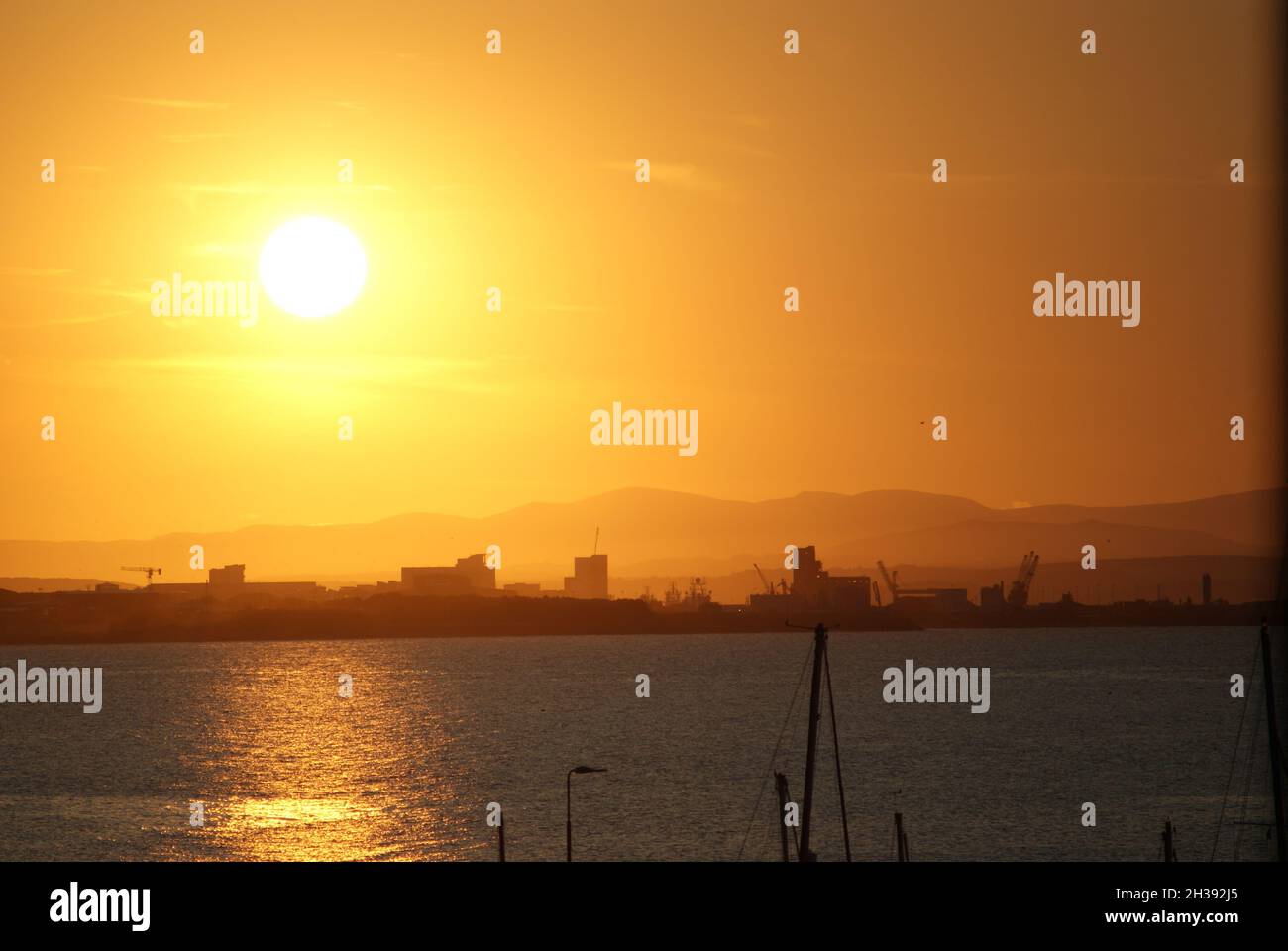 Sunset from Musselburgh looking towards Leith Stock Photo - Alamy