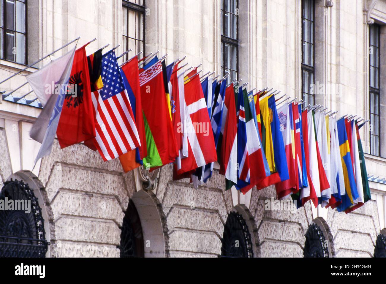 Flags of many nations on a building Stock Photo - Alamy