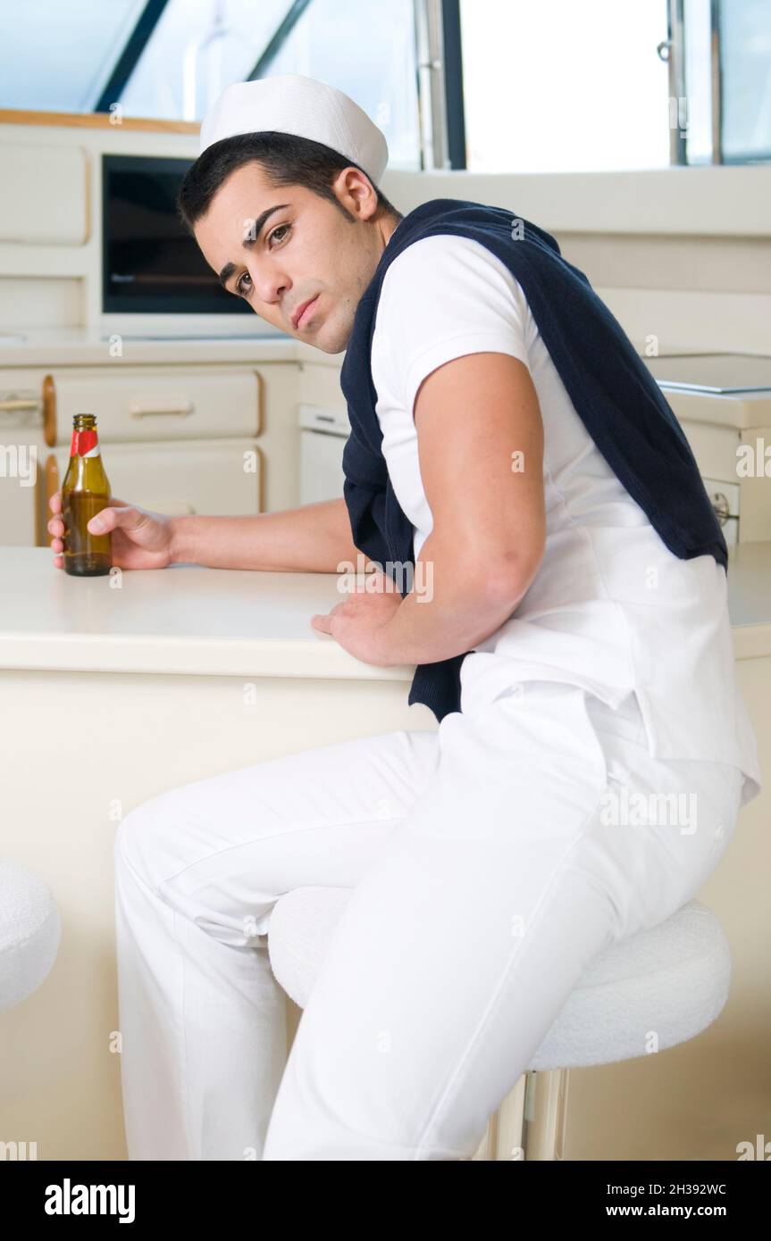 sailor aboard a luxury yacht Stock Photo - Alamy