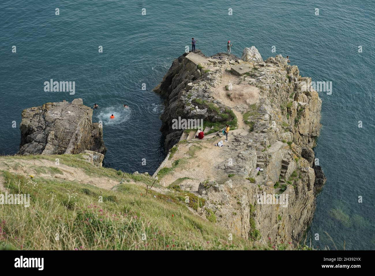 High angle shot of cliffs in the sea at daylight Stock Photo - Alamy