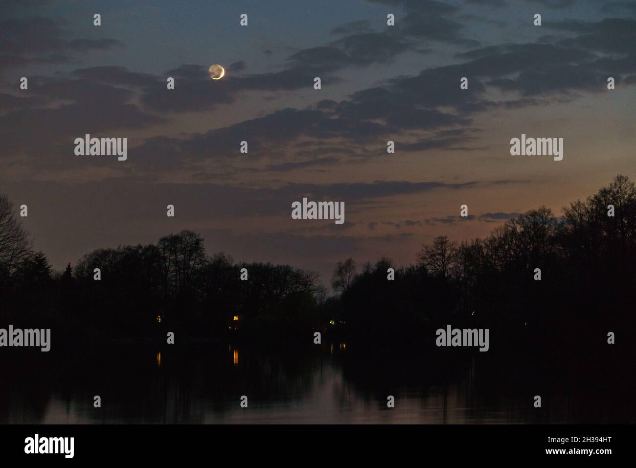 Crescent moon sunset clouds on hi-res stock photography and images - Alamy