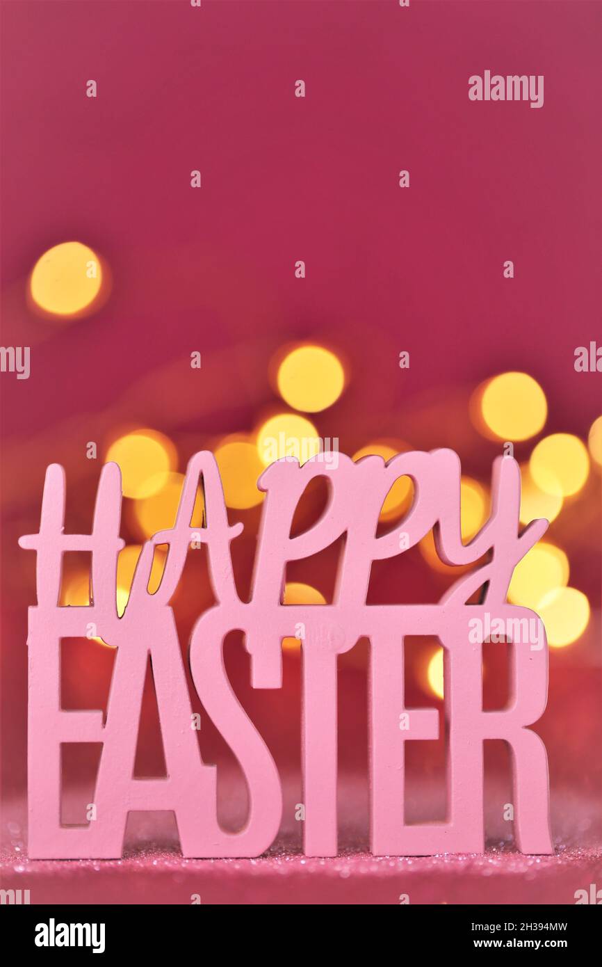 Happy easter. inscription Happy Easter in glitter with golden bokeh ...