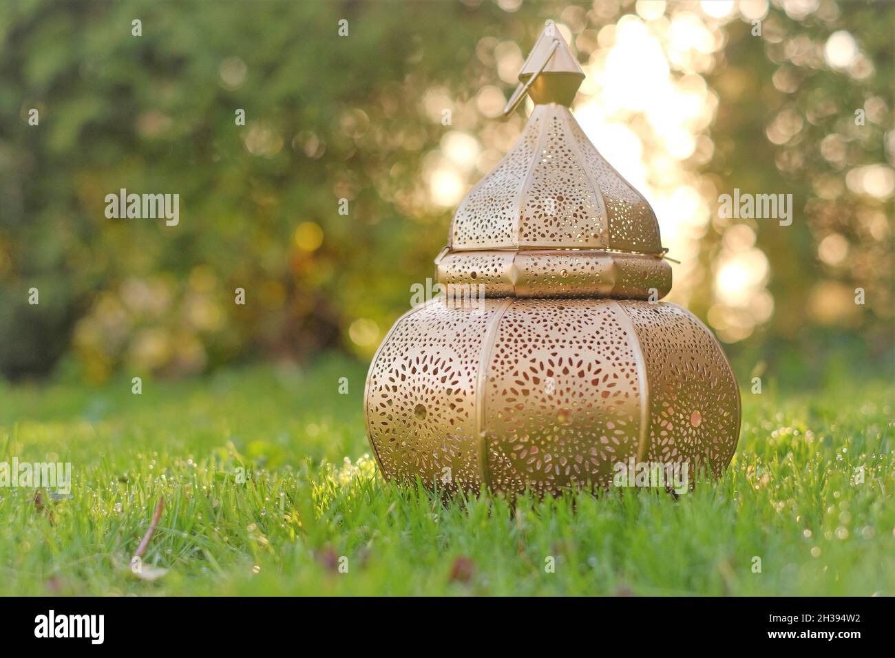 Ramadan time. Muslim holiday Ramadan.lantern Mubarak in the grass in ...