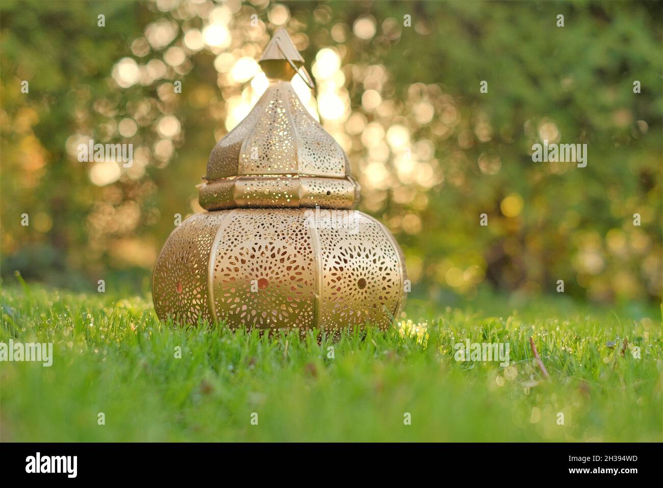 Ramadan time. Muslim holiday Ramadan.lantern Mubarak in the grass in ...