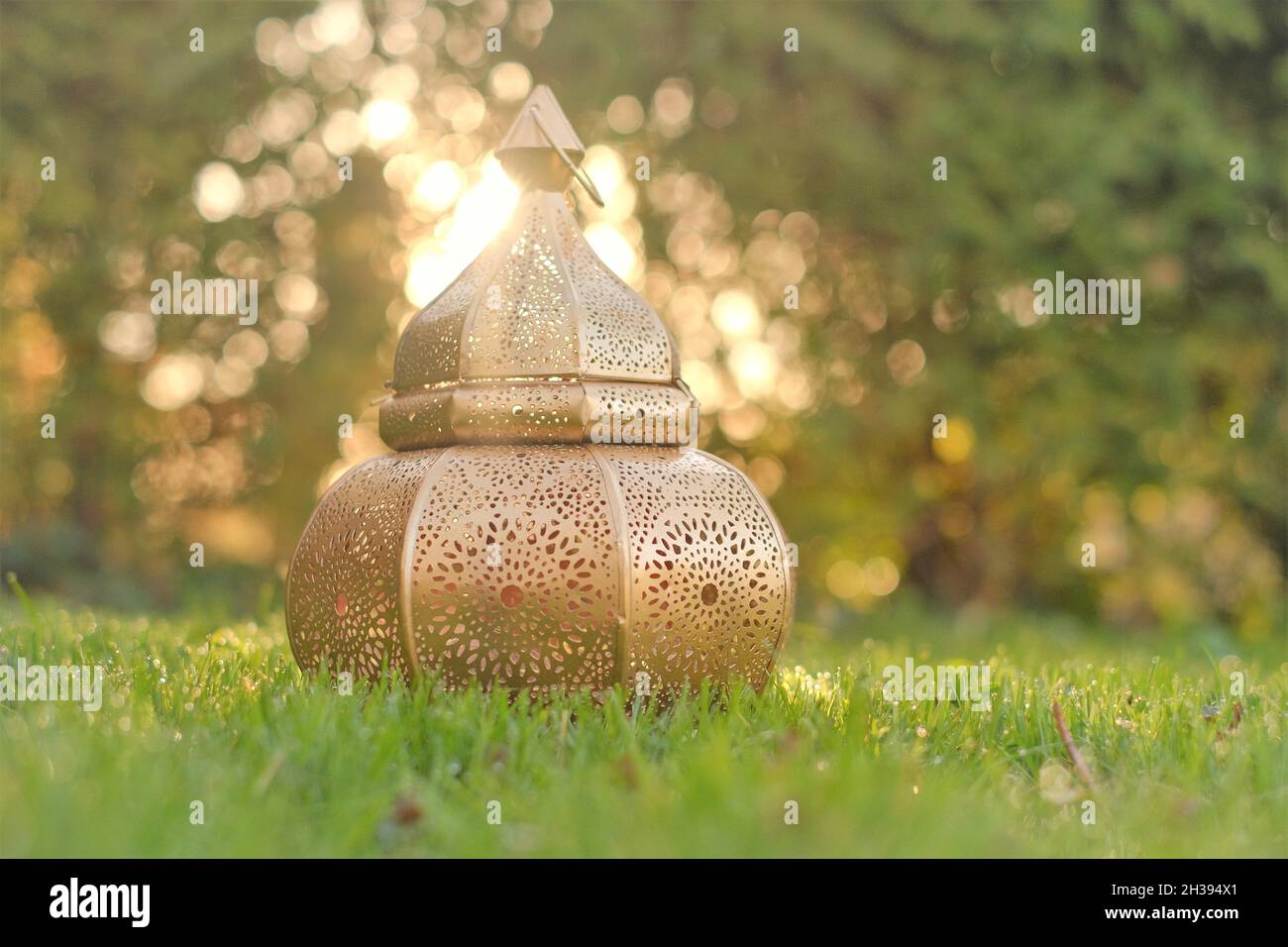 Ramadan time. Muslim holiday Ramadan.lantern Mubarak in the grass ...