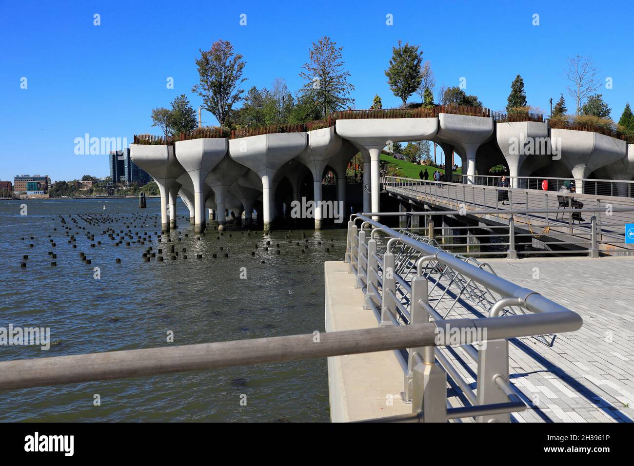 The view of Little Island at Pier 55 with it's South Bridge from Hudson ...